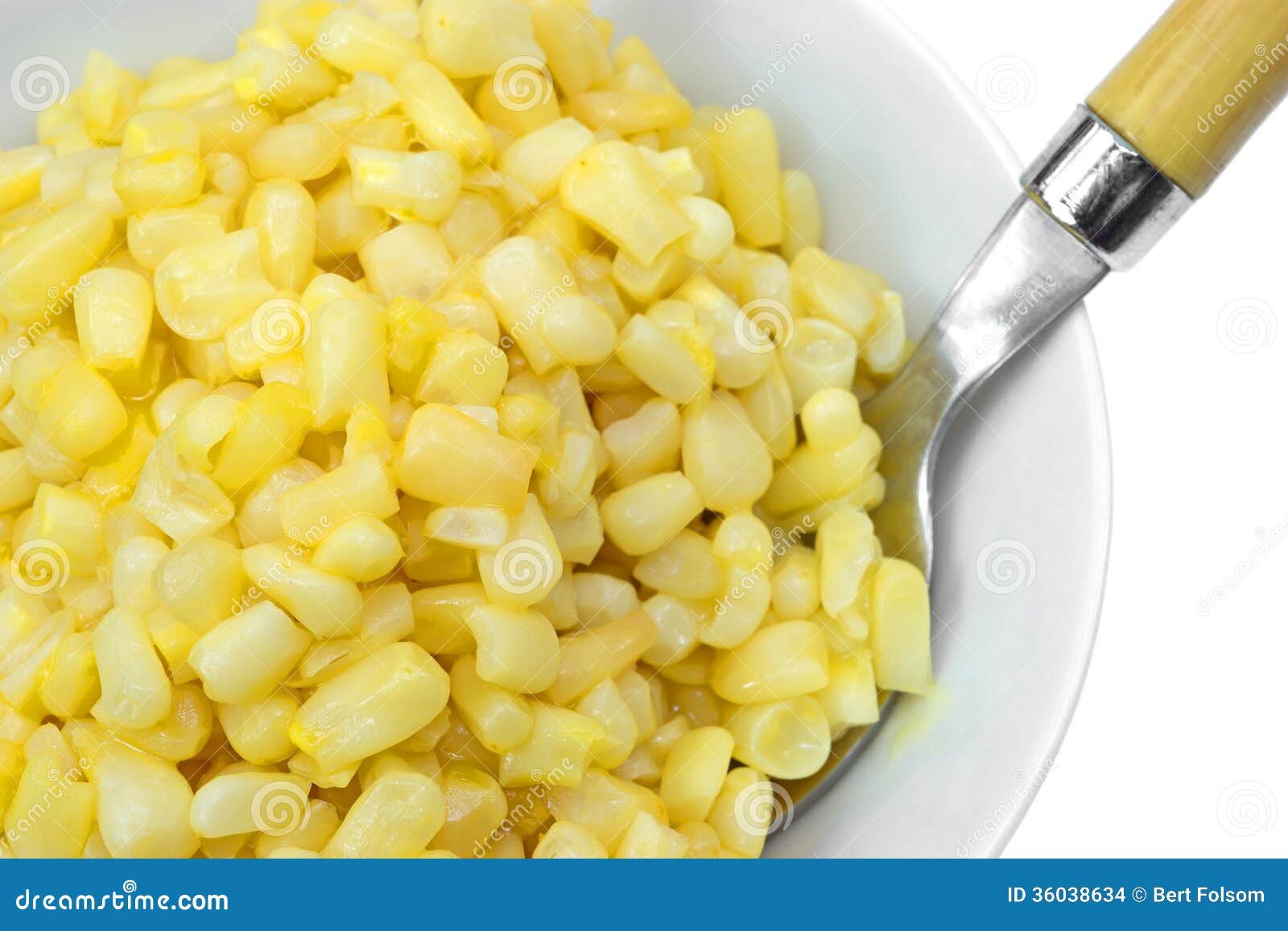 Close View Of Buttered Corn In Bowl Wit Spoon Stock Photo - Image of ...