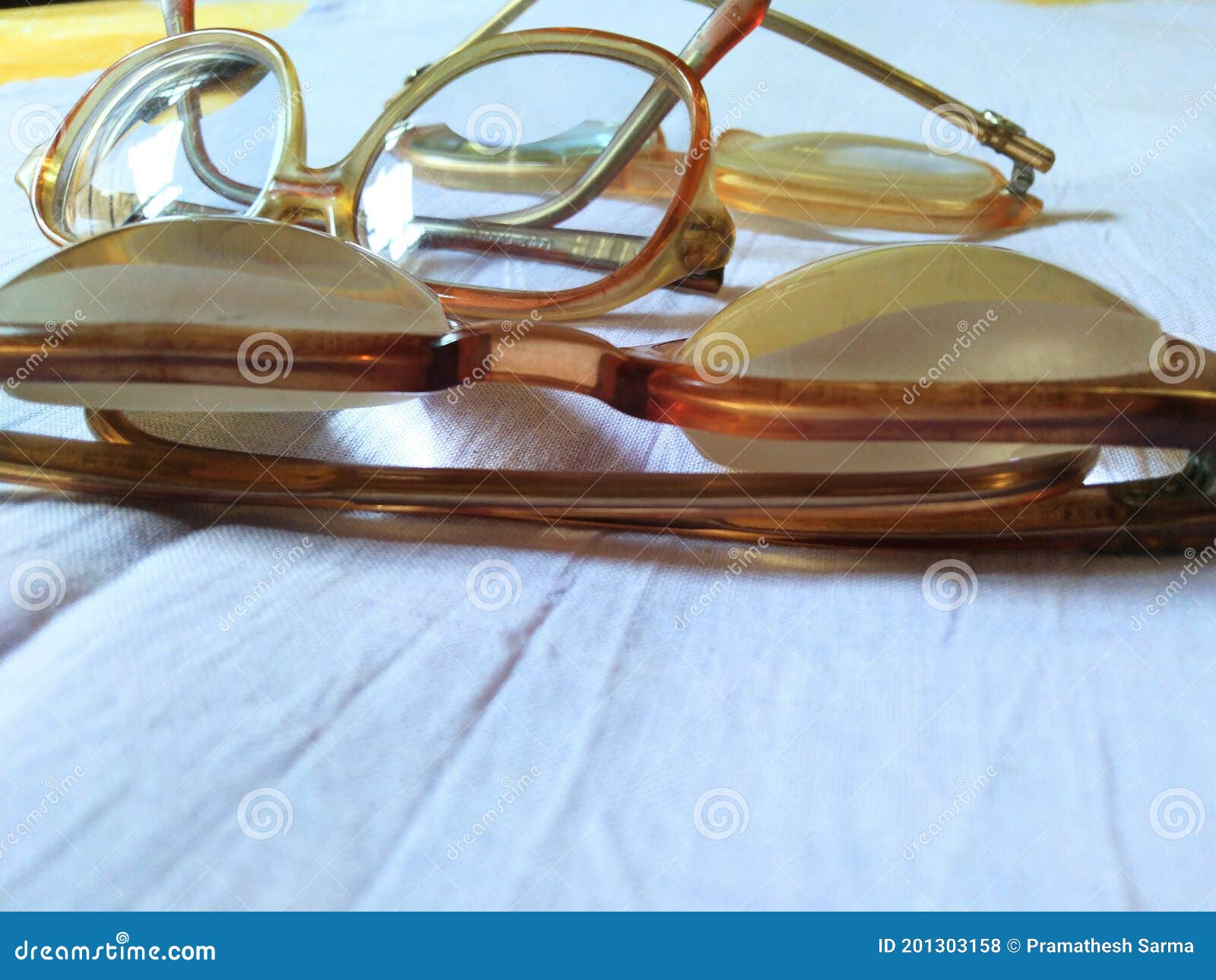 A Close View of High Power Eye Glasses on a White Background Stock ...