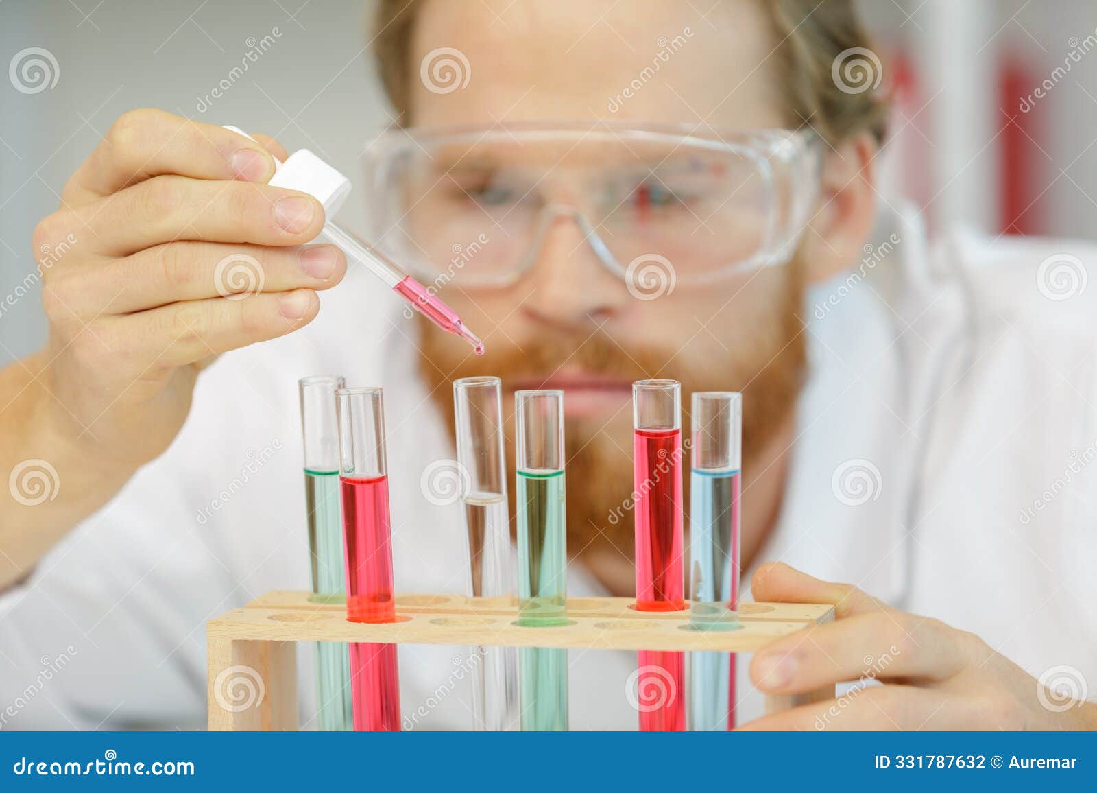 Close Up Scientist Looking Through A Microscope In A Laboratory ...