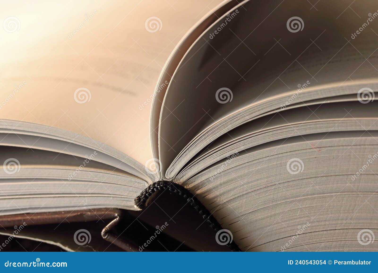 CLOSE VIEW of OPEN BOOK with CURVED PAGES Stock Photo - Image of open ...