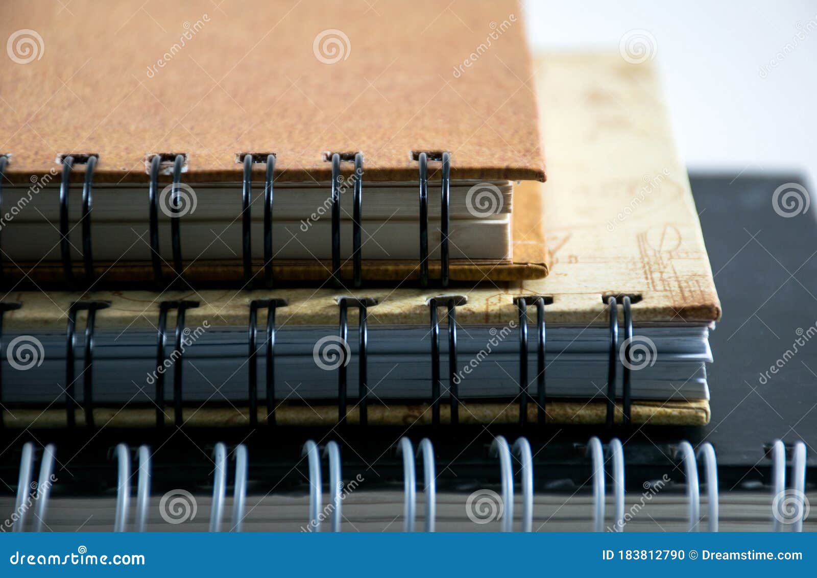 A Close View of an Open Diary or Notepad with Rings Isolated on a White ...