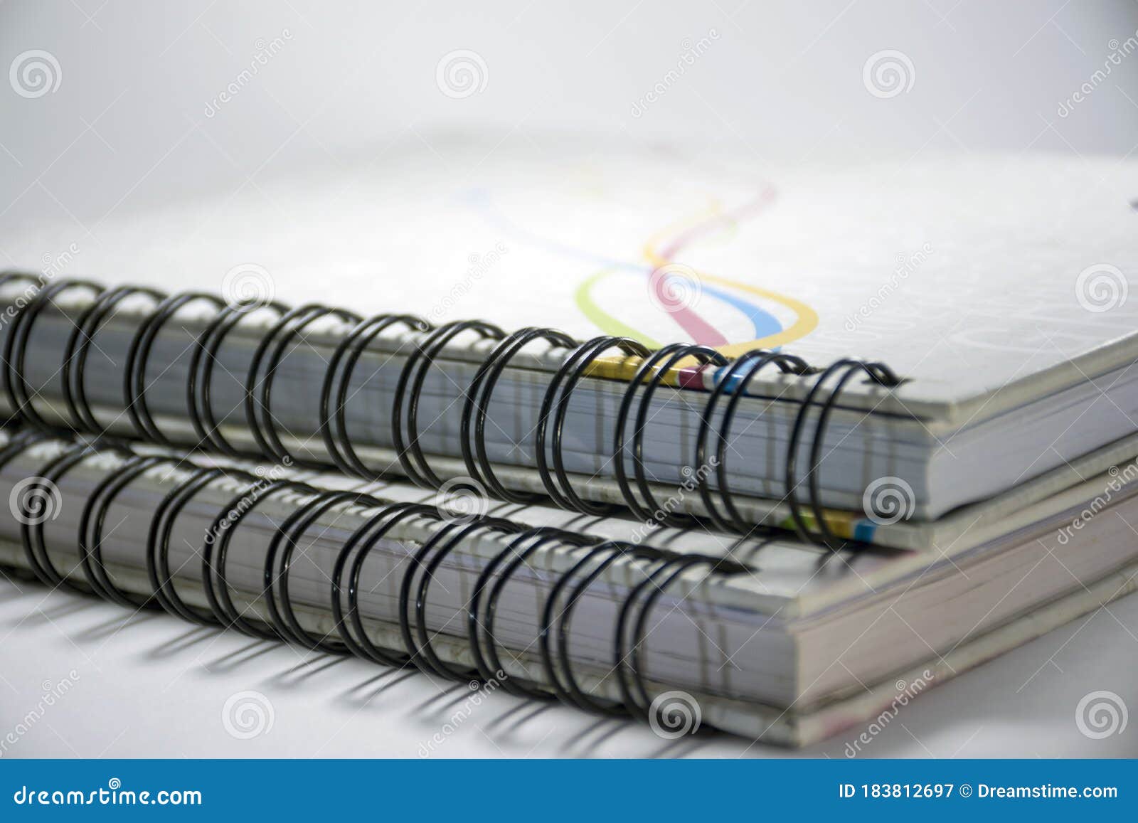 A Close View of an Open Diary or Notepad with Rings Isolated on a White ...