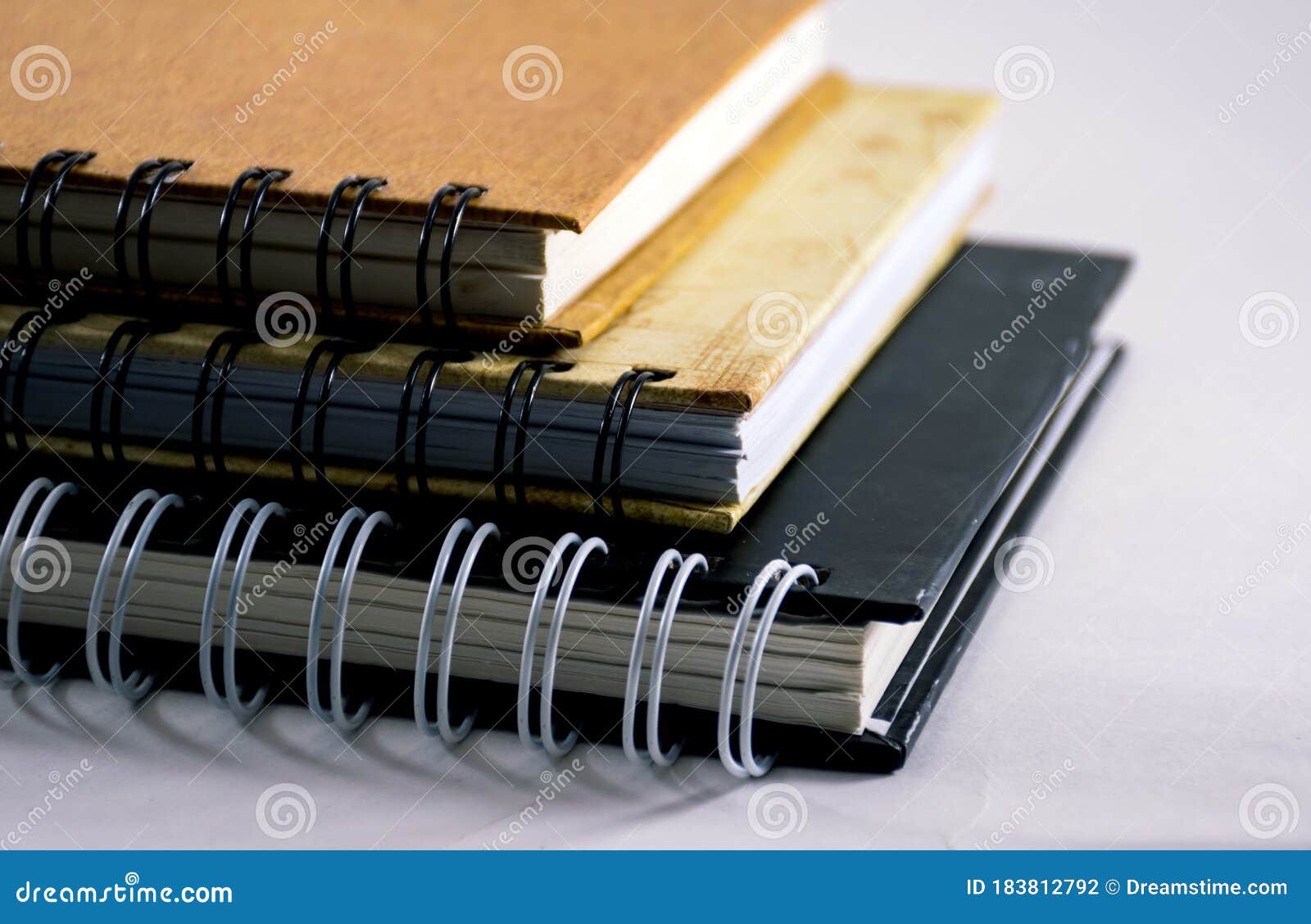 A Close View of an Open Diary or Notepad with Rings Isolated on a White ...