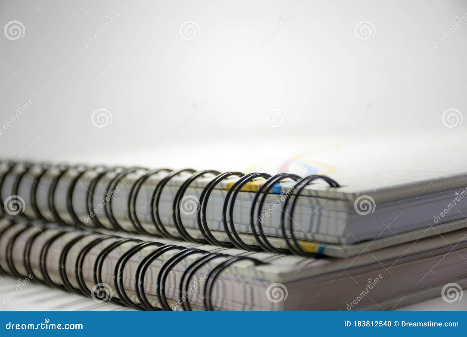 A Close View of an Open Diary or Notepad with Rings Isolated on a White ...