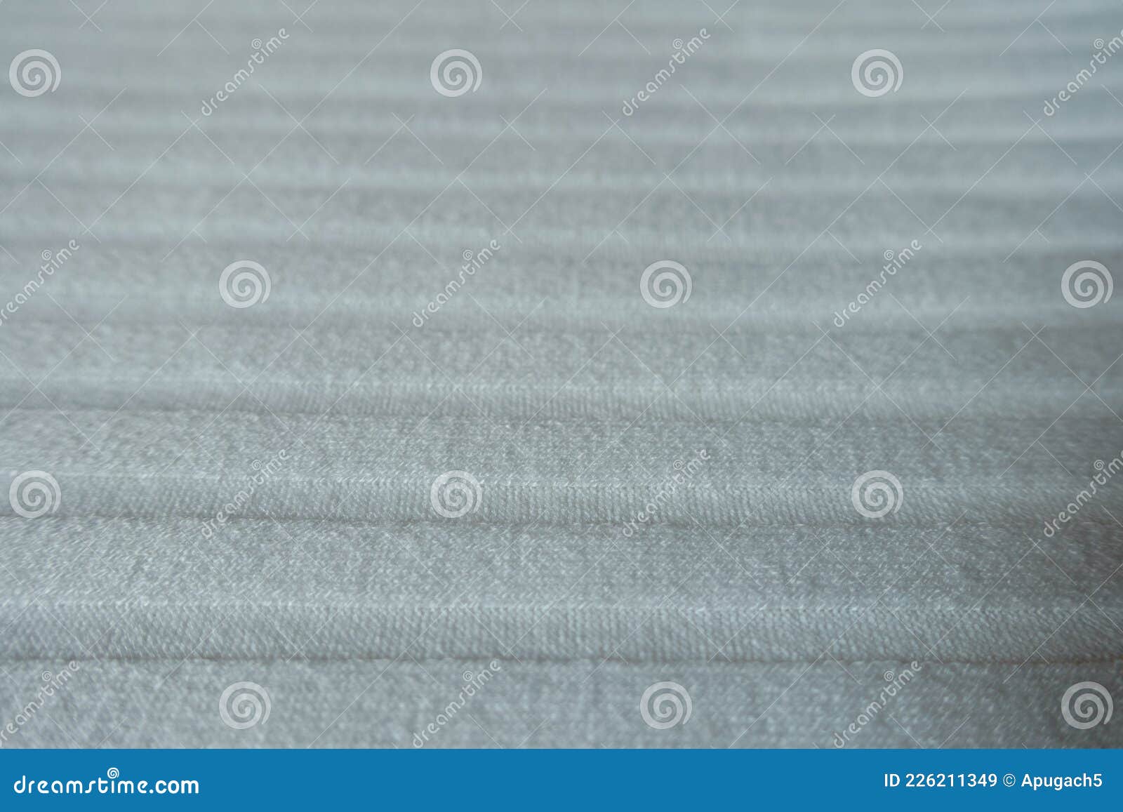 White Ribbed Bathroom Tile With Flower Insert In The Middle. Stock ...