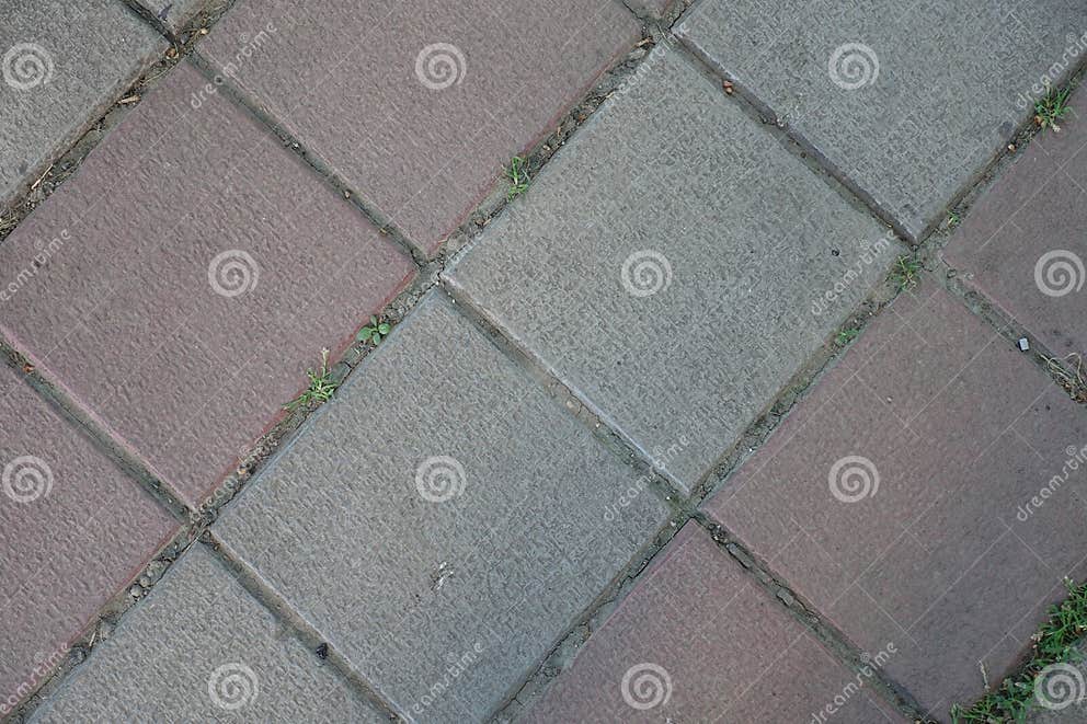 Close View of Stack Bond Brick-like Gray and Pink Concrete Pavement ...