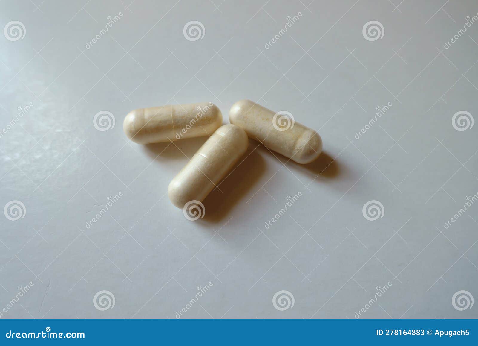 Close View of Three Beige Capsules of Probiotic Dietary Supplement ...