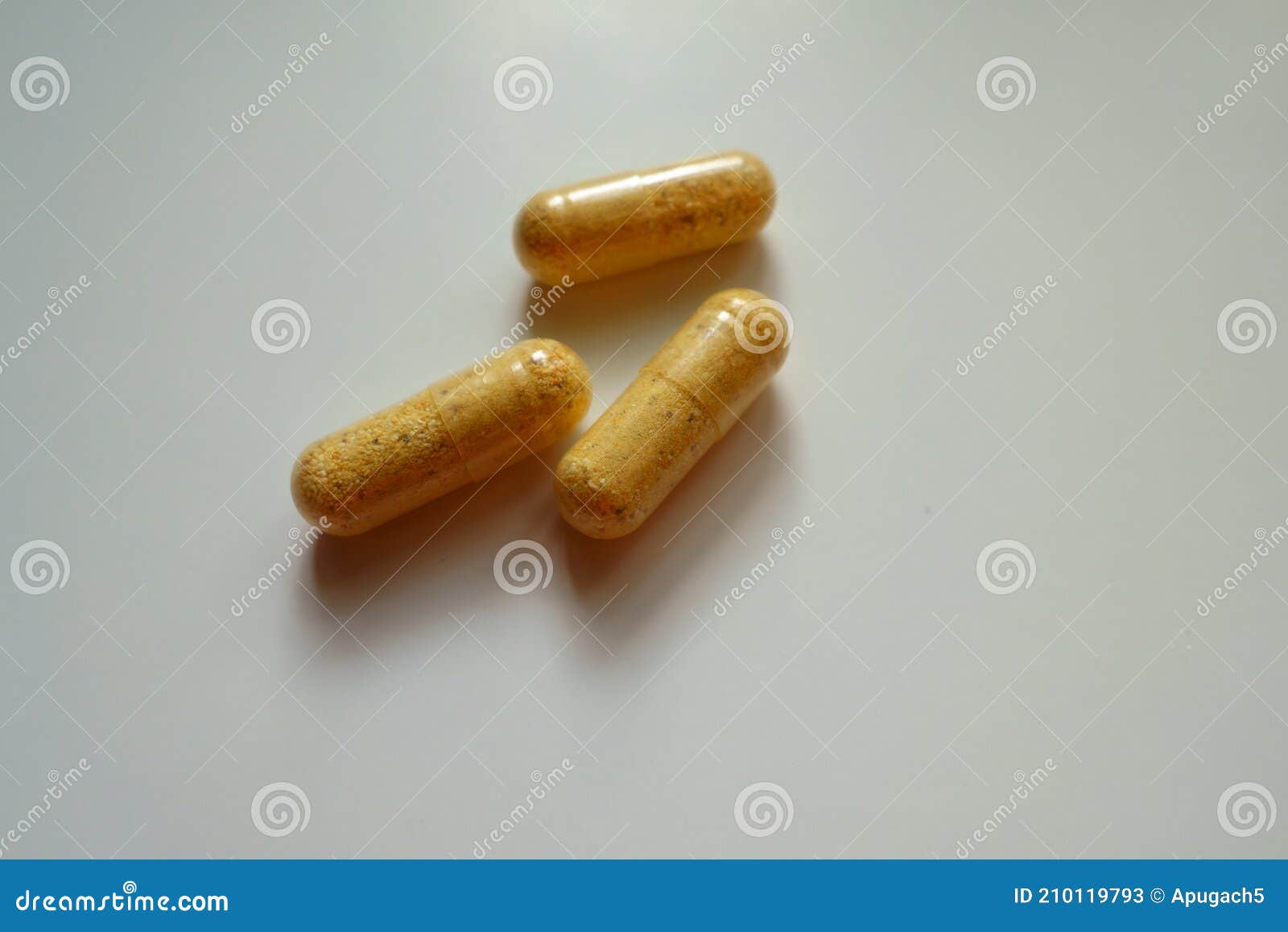 Close View of Three Orange Capsules of Multivitamins Stock Image ...