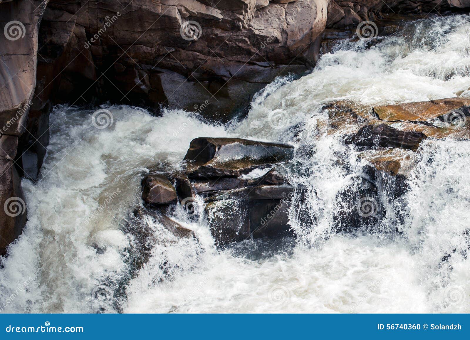 A Close View of Wet Stone in the Fast Mountain River Stock Photo ...
