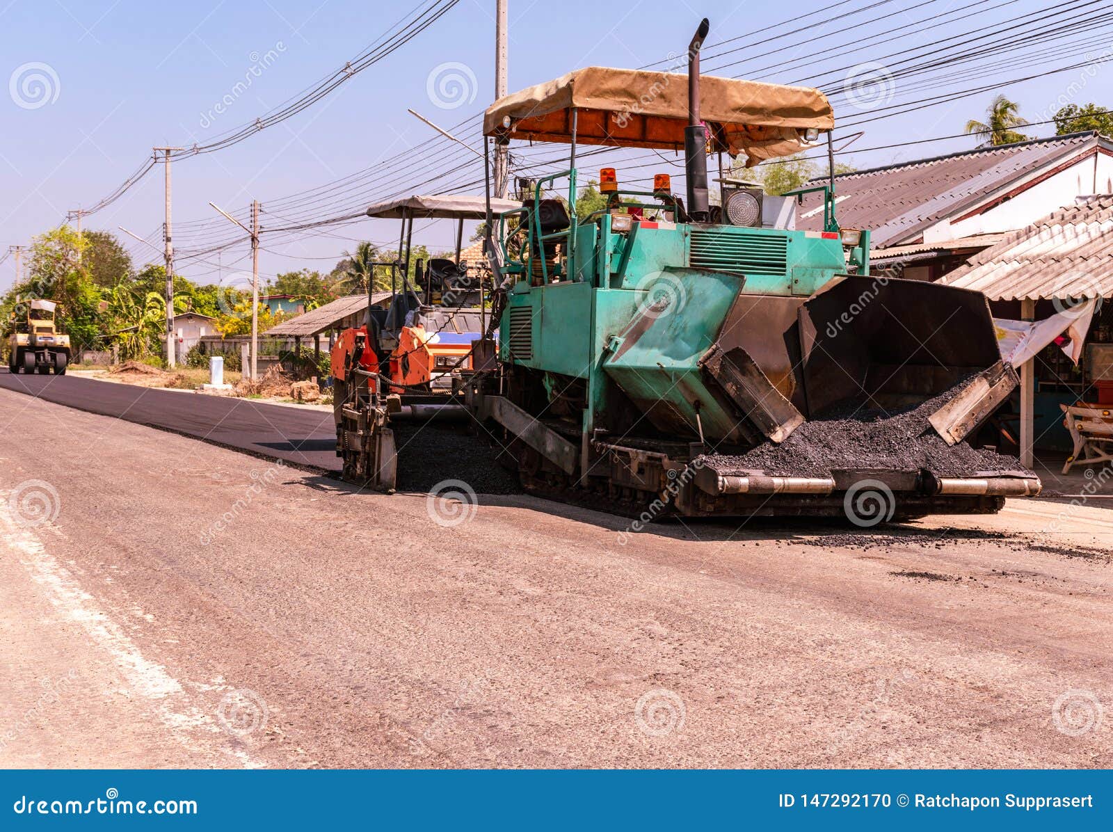 Close View on the Workers and the Asphalting Machines, Workers Making ...