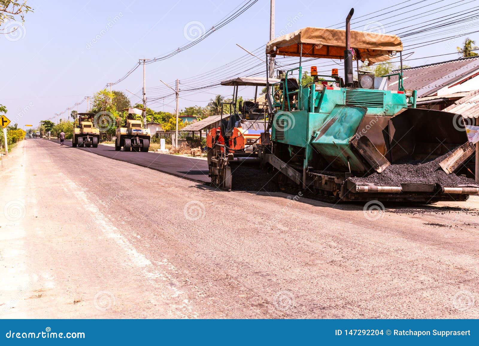 Close View on the Workers and the Asphalting Machines, Workers Making ...