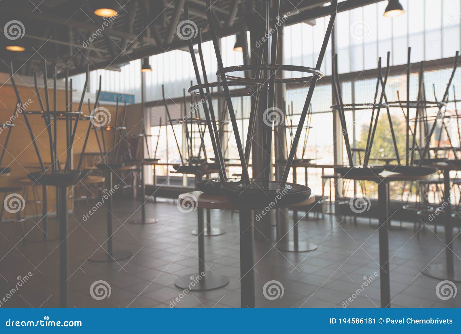 Closed Cafe with Overturned Chairs on Tables Stock Image - Image of ...