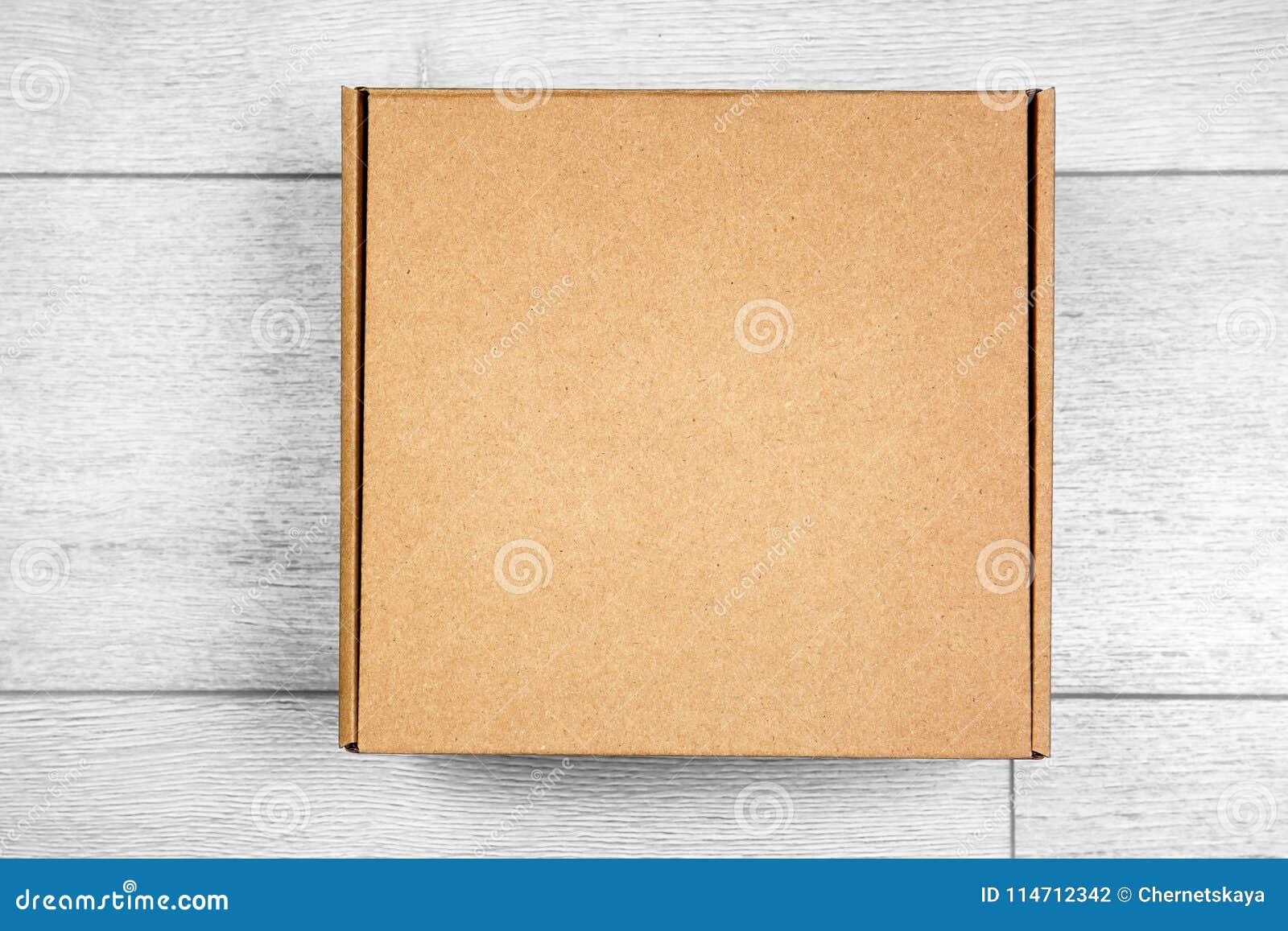 Closed Cardboard Box on Floor Stock Photo - Image of mail, courier ...