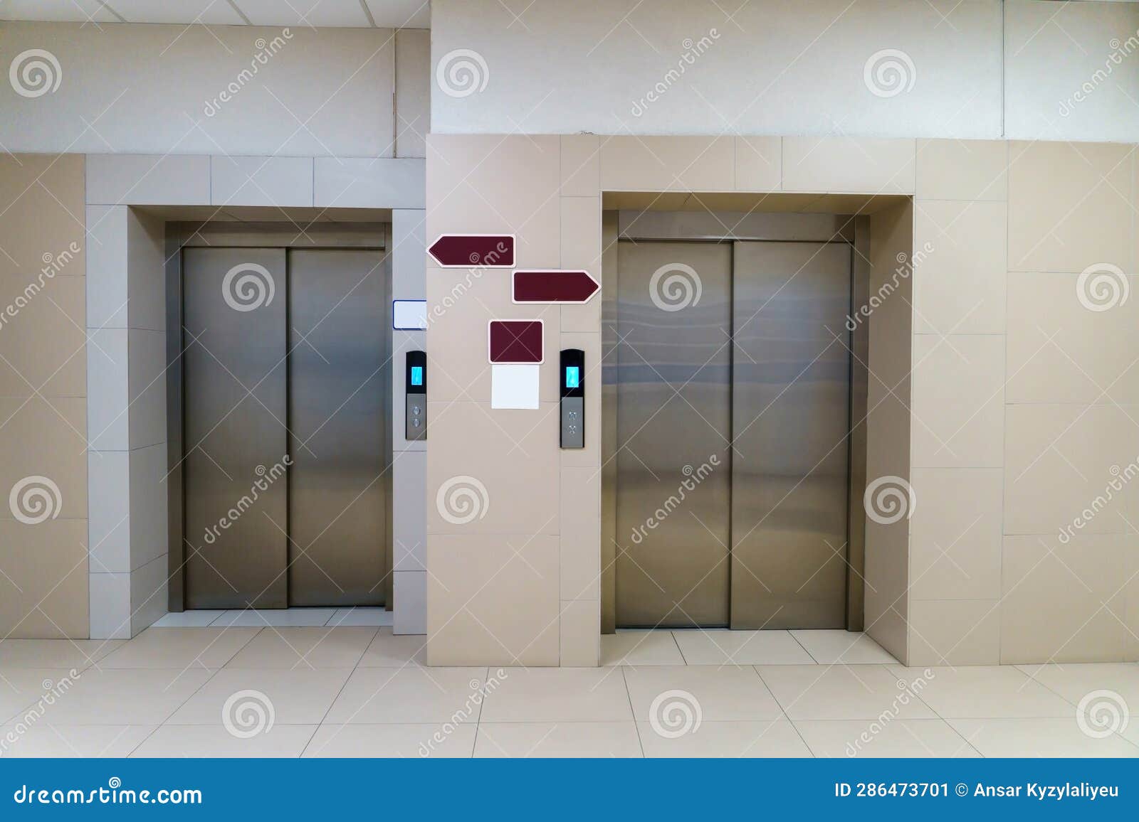 Closed Elevator Doors. Shiny Metal Elevator Doors in a New Modern ...