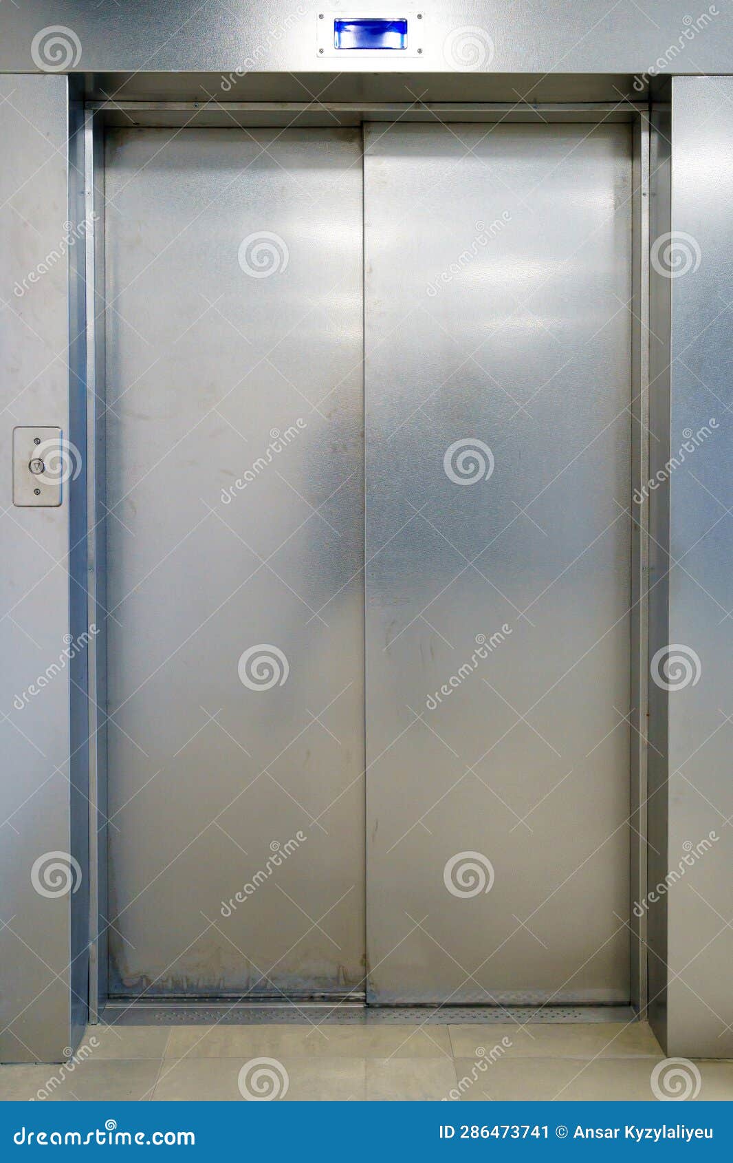 Closed Elevator Doors. Shiny Metal Elevator Doors in a New Modern ...