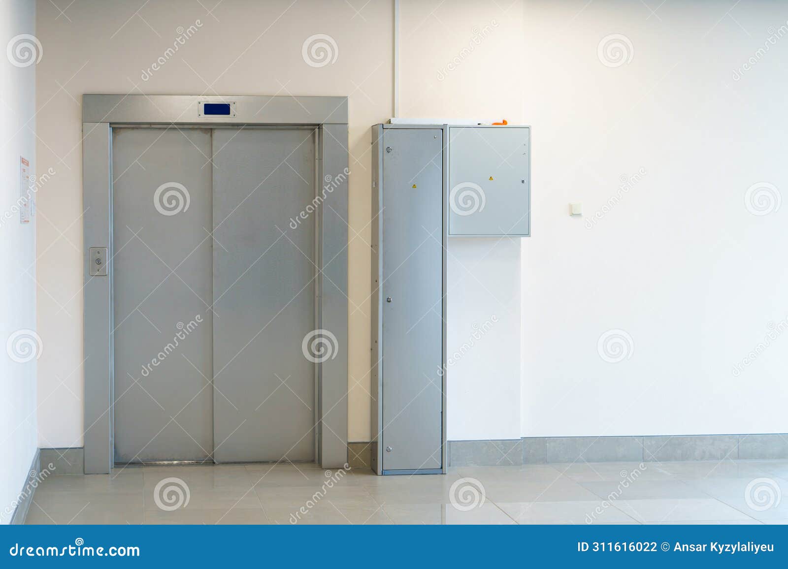 Closed Elevator Doors. Shiny Metal Elevator Doors in a New Modern ...