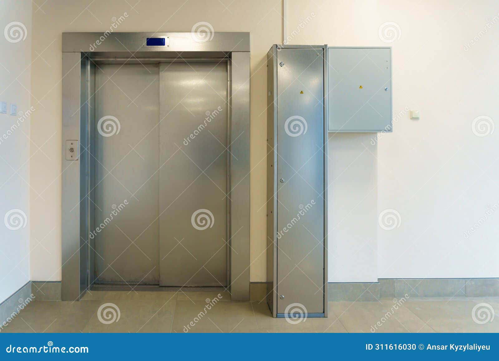 Closed Elevator Doors. Shiny Metal Elevator Doors in a New Modern ...