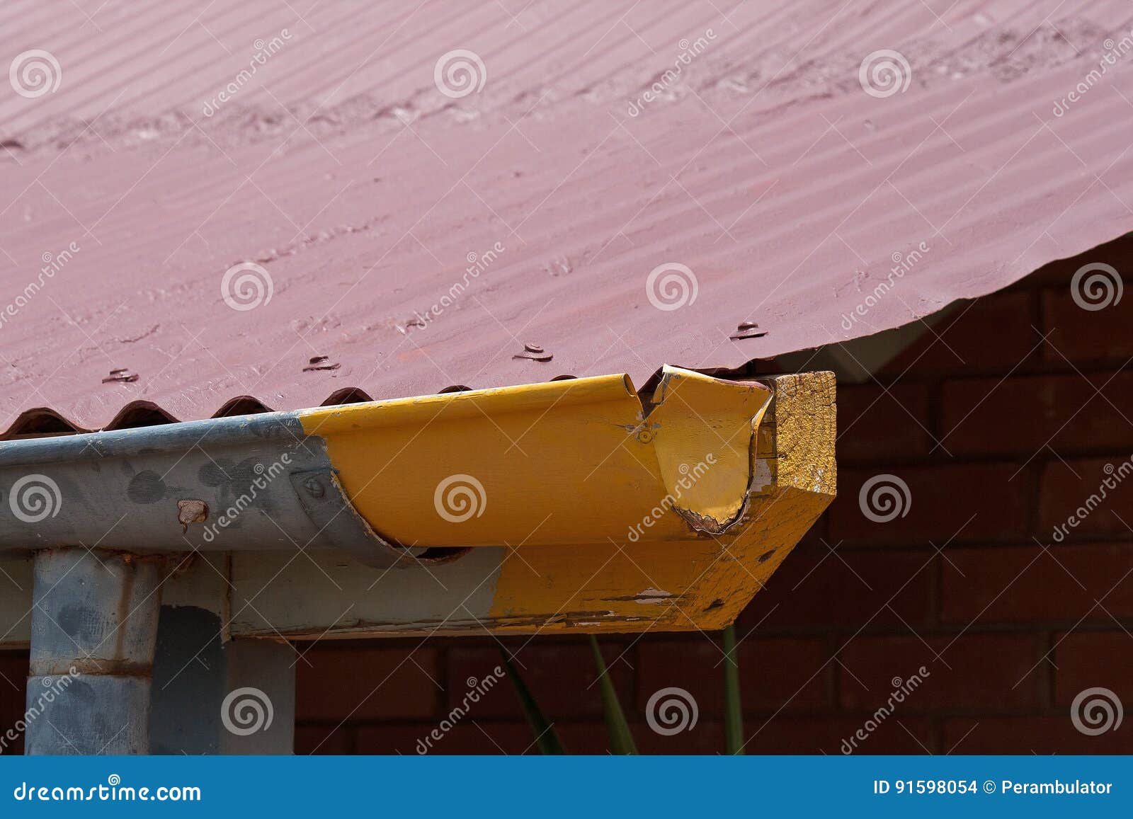 CLOSED ENDED YELLOW GUTTER stock photo. Image of attached - 91598054