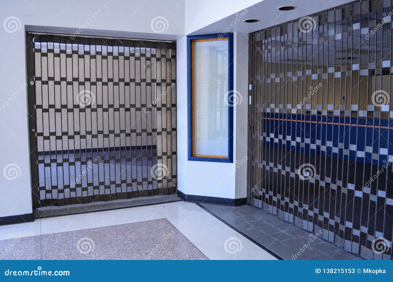 Closed, Gated Store Inside of a Dead Shopping Mall Stock Image - Image ...