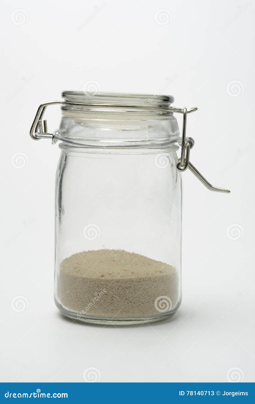 Closed glass jar with sand stock image. Image of metal - 78140713