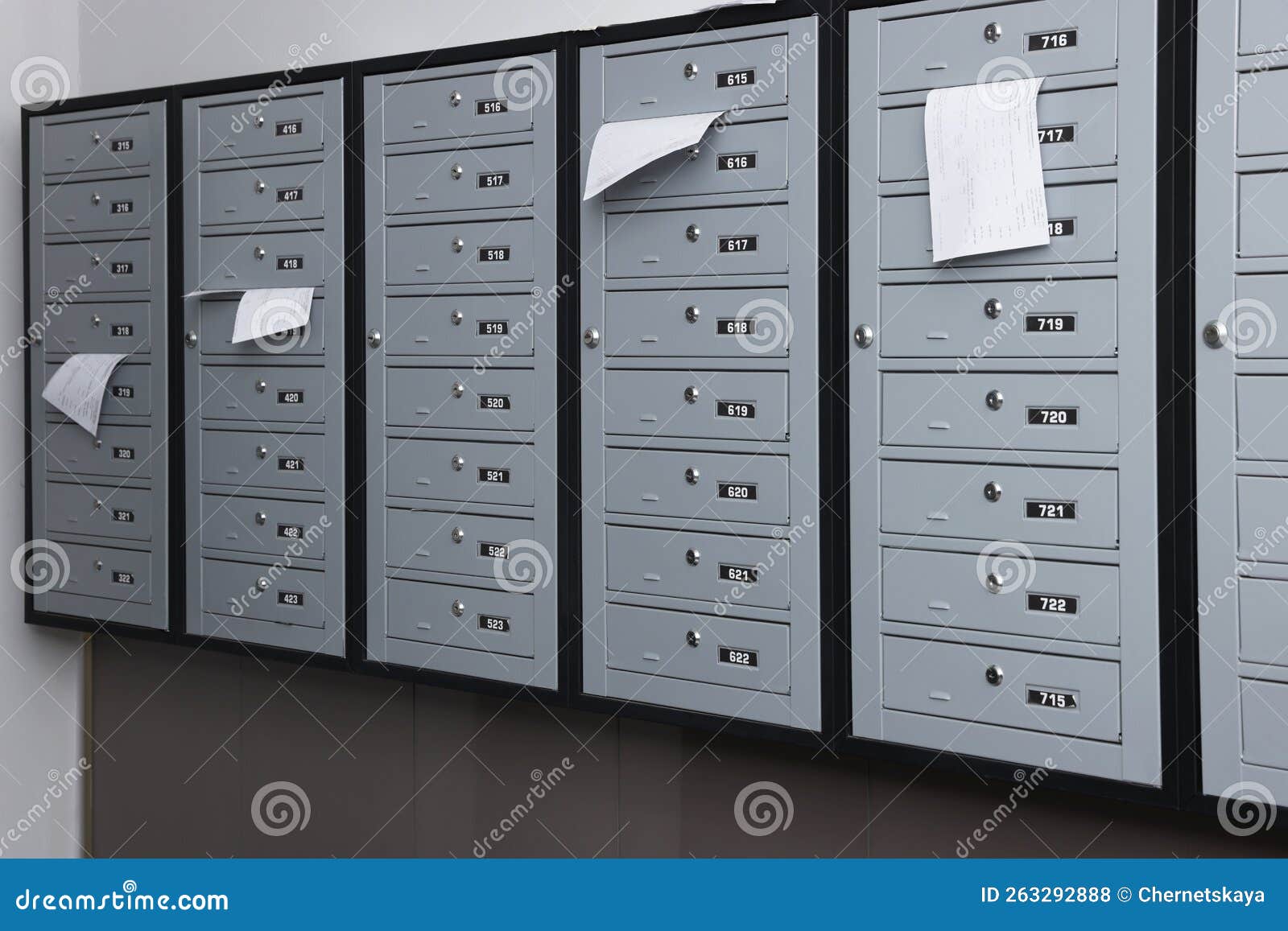 Closed Grey Metal Mailboxes with Receipts Indoors Stock Photo - Image ...