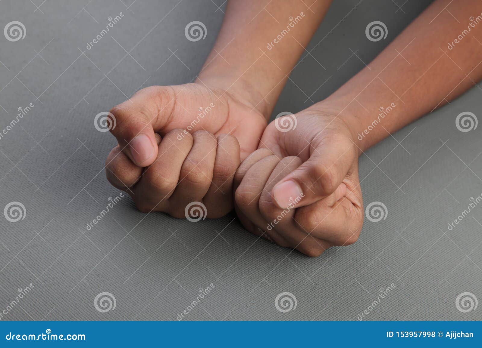 Closed Hands on a Grey Area Stock Photo - Image of isolated ...