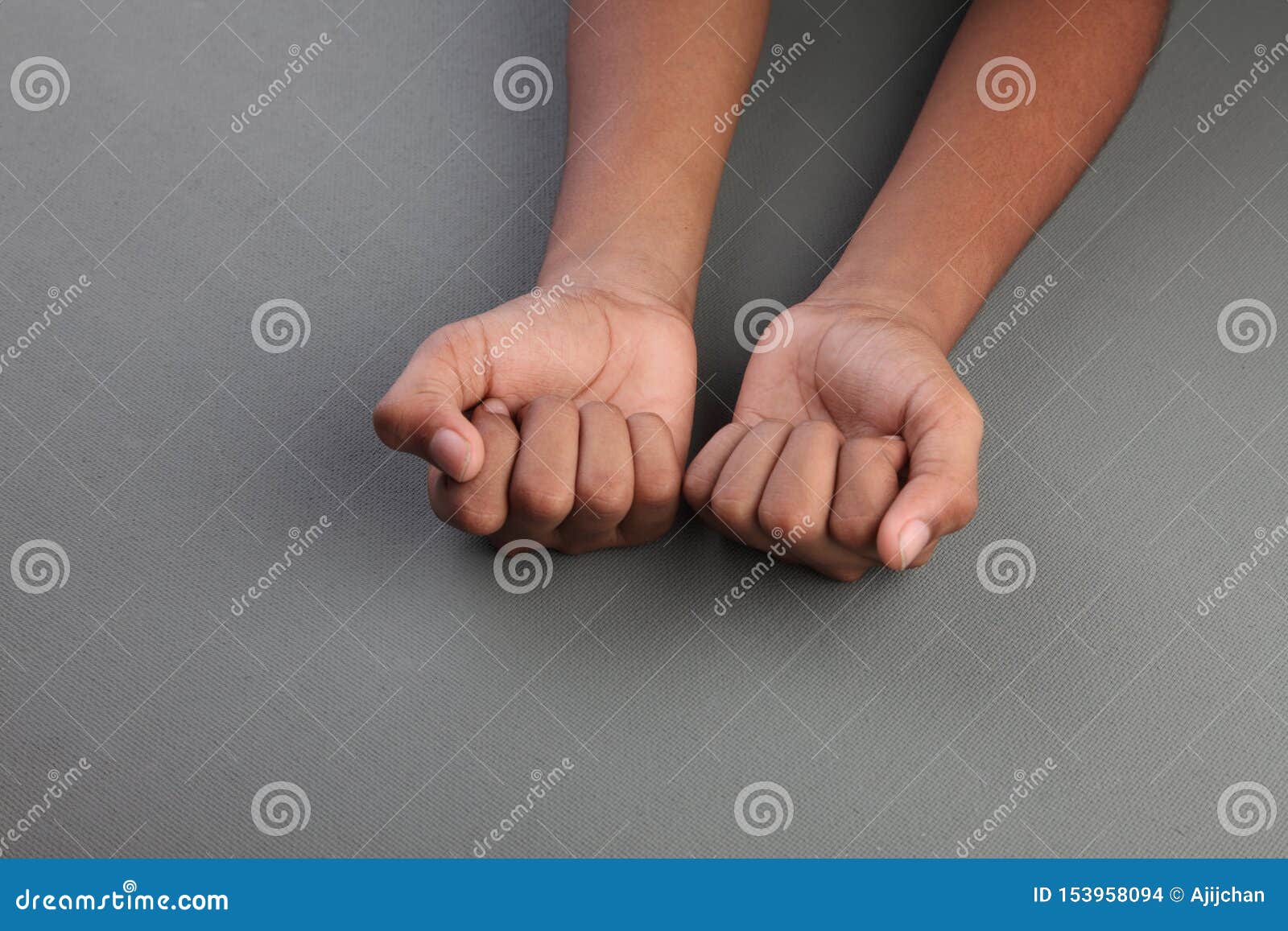 Closed Hands on a Grey Area Stock Photo - Image of concept, grey: 153958094