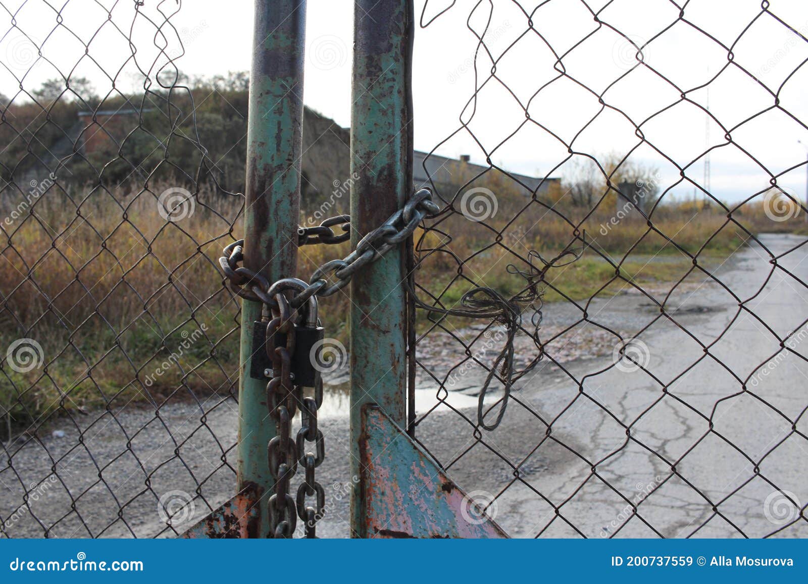 Closed Iron Gates with a Fence To the Restricted Area Stock Image ...
