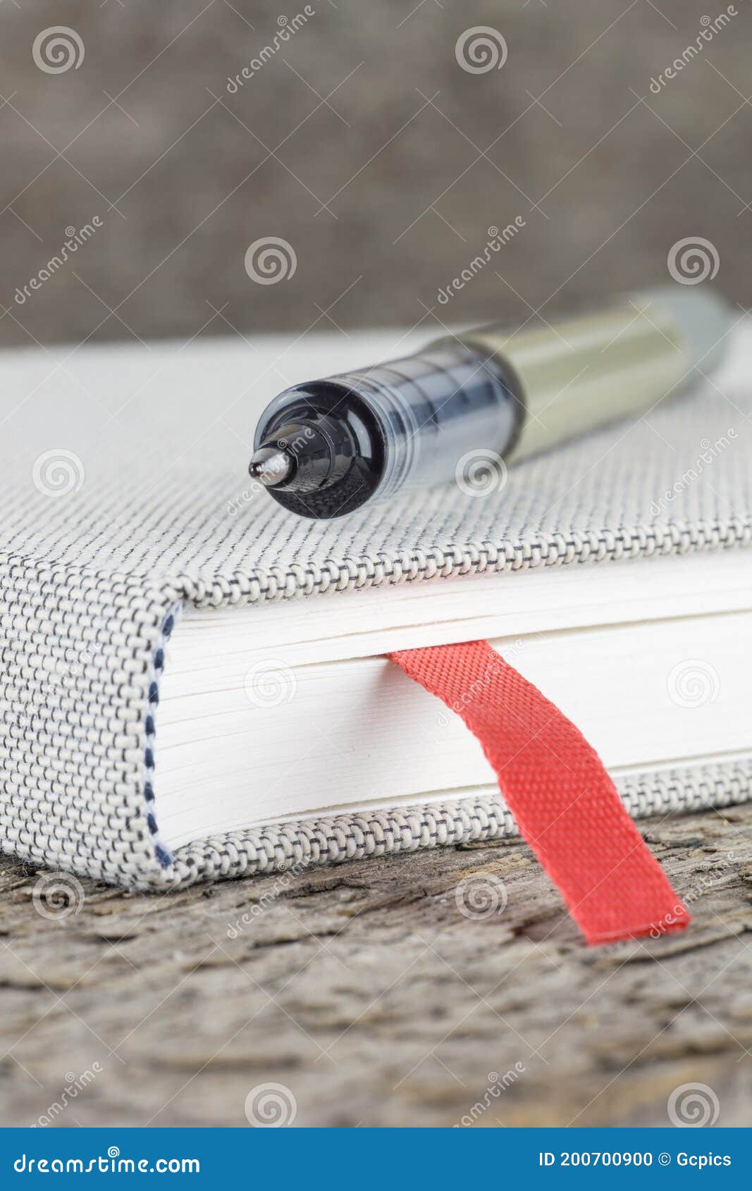 A Closed Journal Diary Book and Pen on a Wooden Table Stock Photo ...