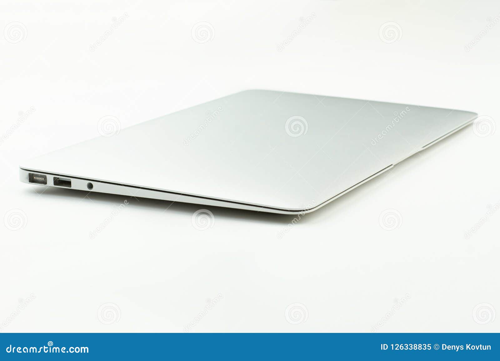 Closed Laptop on White Desktop. Stock Image - Image of desk, desktop ...
