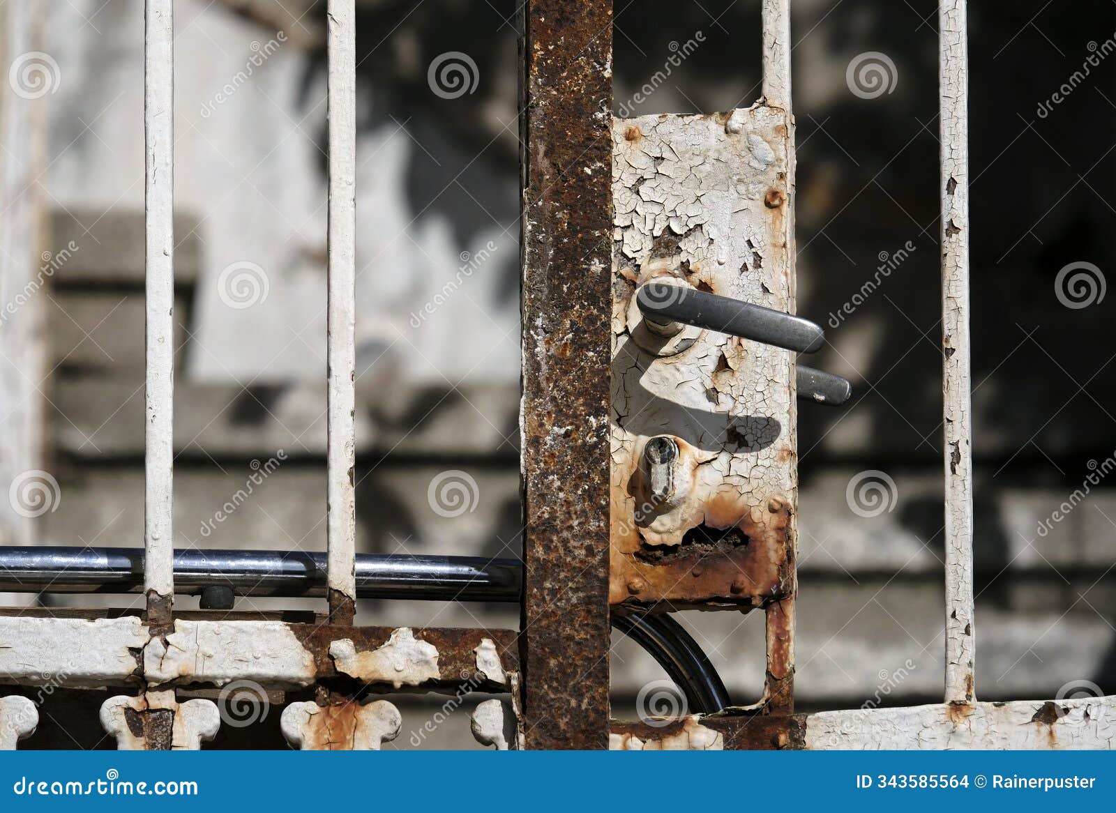 Locked Old Rusty Yellow Door With High Voltage Sign. Grey Wall Of ...