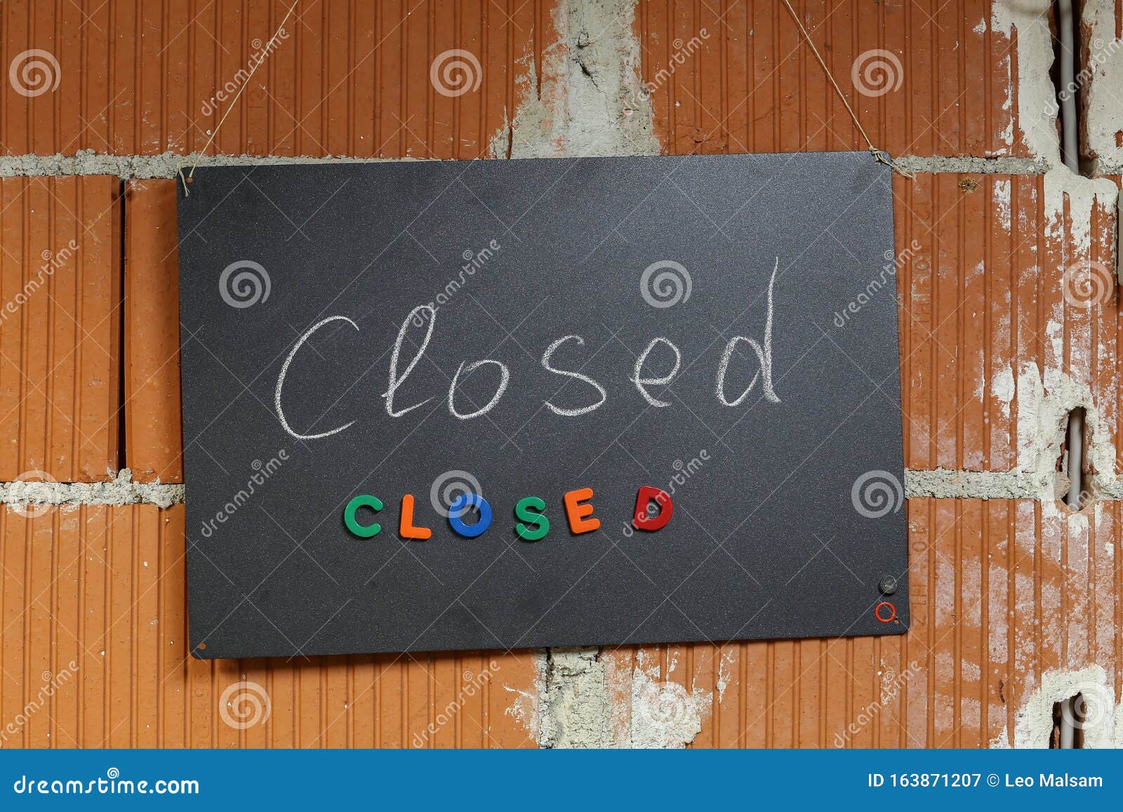 Closed - a Nameplate Hanging on a Brick Wall Stock Image - Image of ...