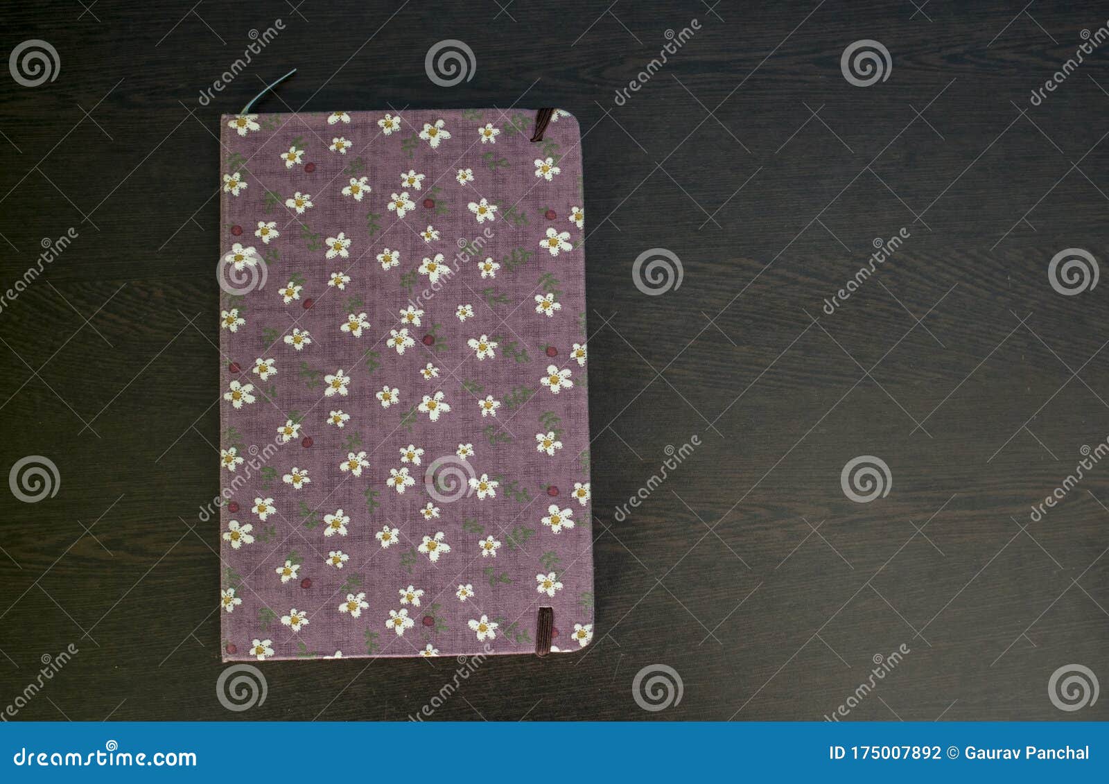 A Closed Notebook on a Table Stock Photo - Image of study, notebook ...