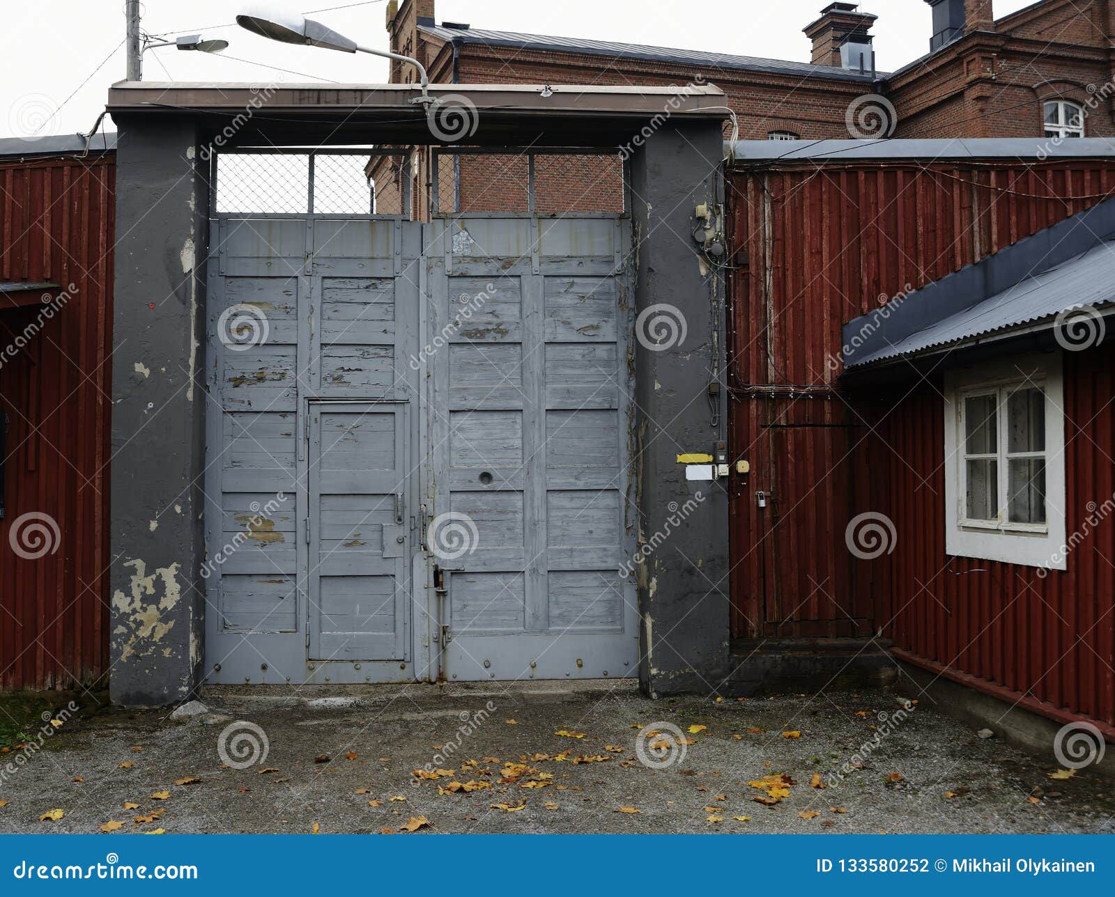 Closed old prison gates stock photo. Image of facade - 133580252