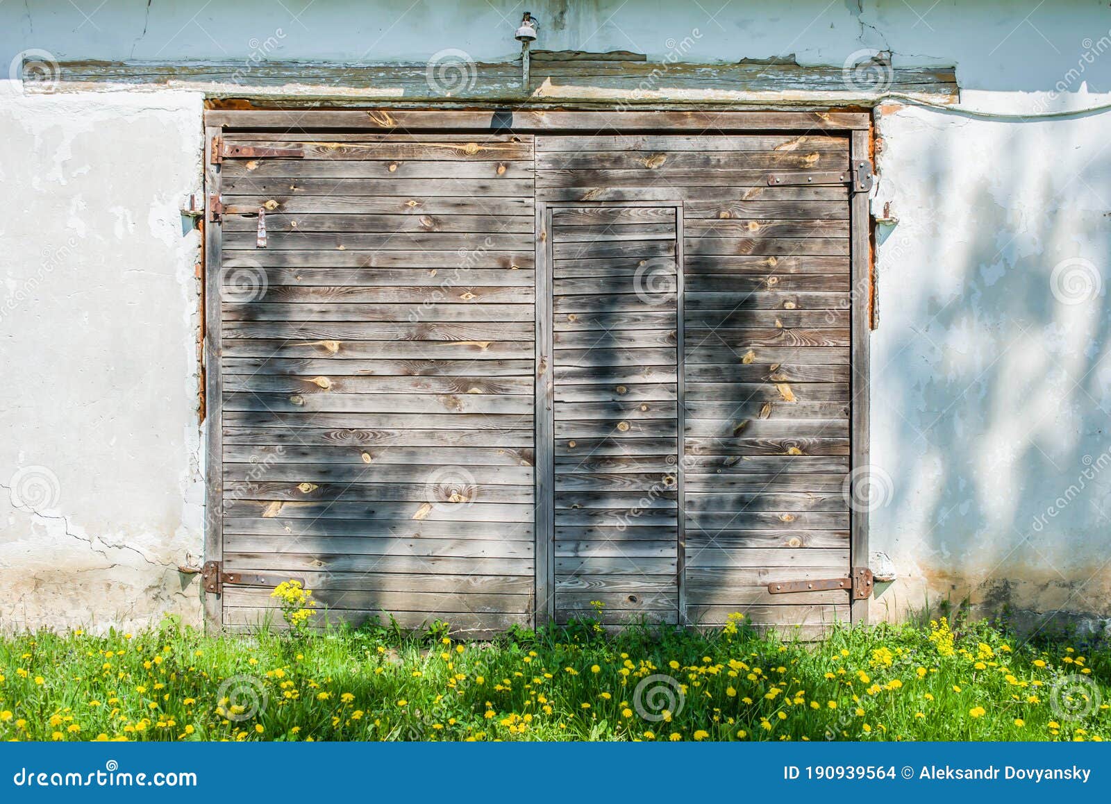 Closed Old Wooden Gate on a Stone Wall. Green Grass Stock Photo - Image ...
