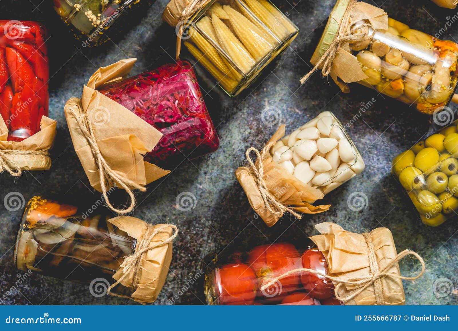 Closed Pickling Jars with Various Vegetables on Stone Table Stock Image ...