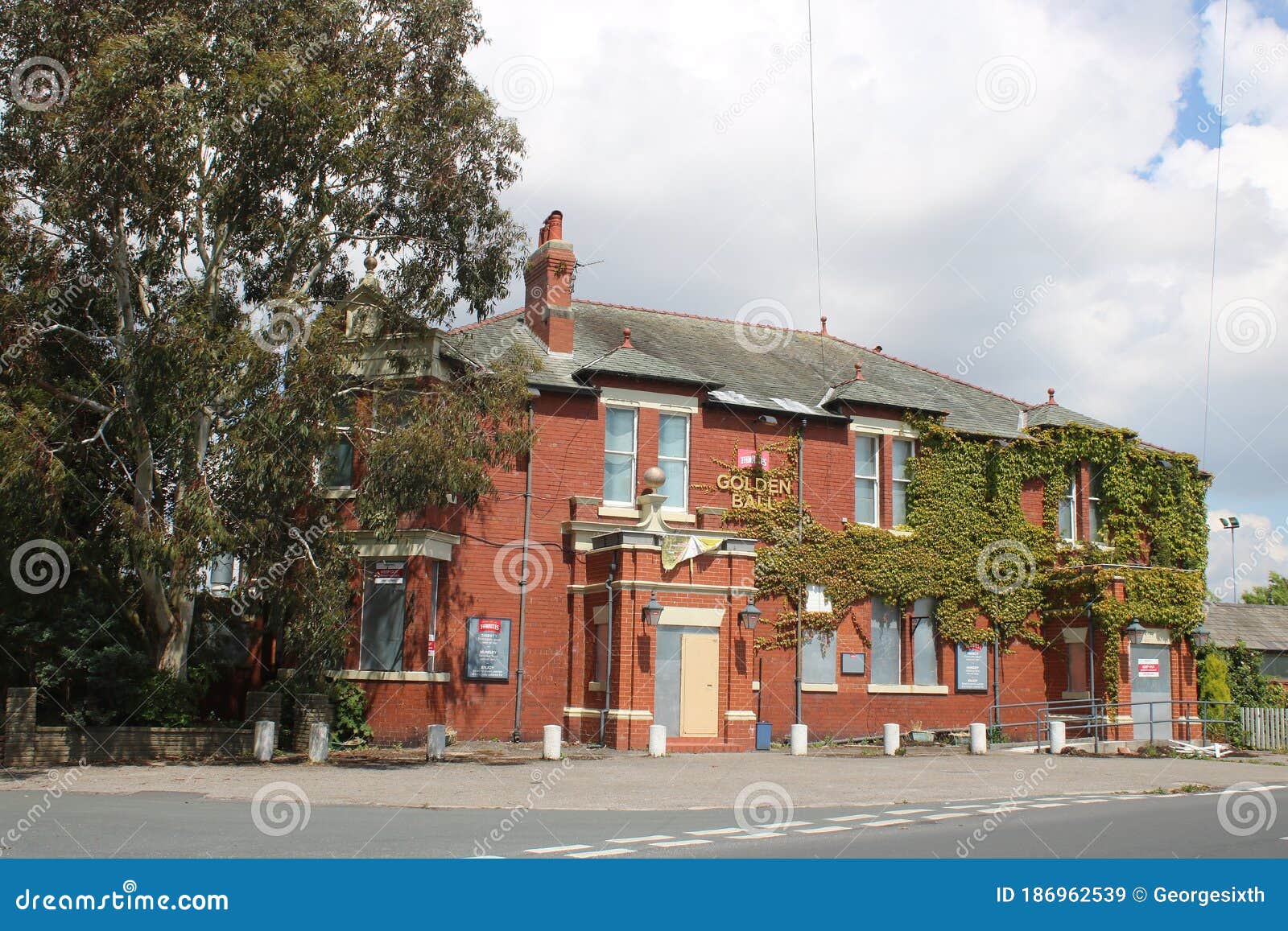 Closed Pub with Shutters Over Doors and Windows Editorial Stock Image ...