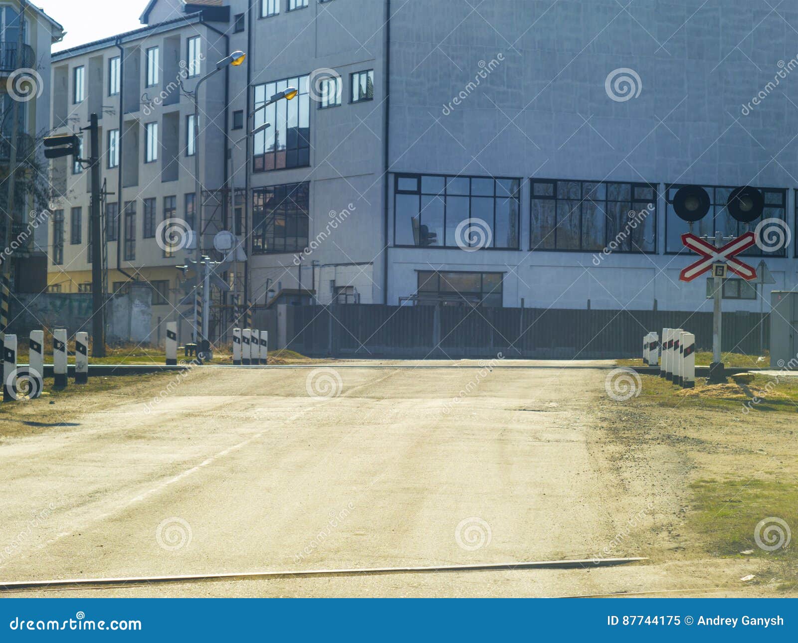 Closed Railroad Crossing in Front of Train Passing Stock Image - Image ...