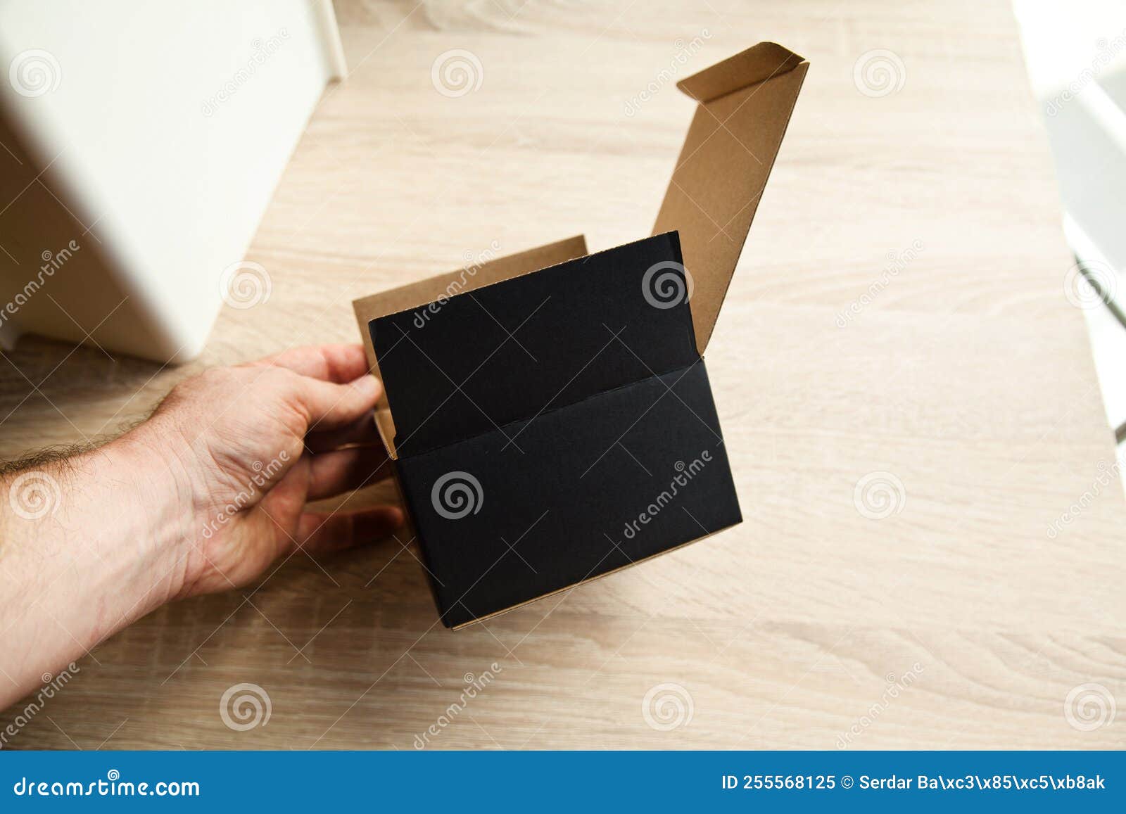 Closed Rectangular Cardboard Box with Corrugated Cardboard Lid and Hand ...