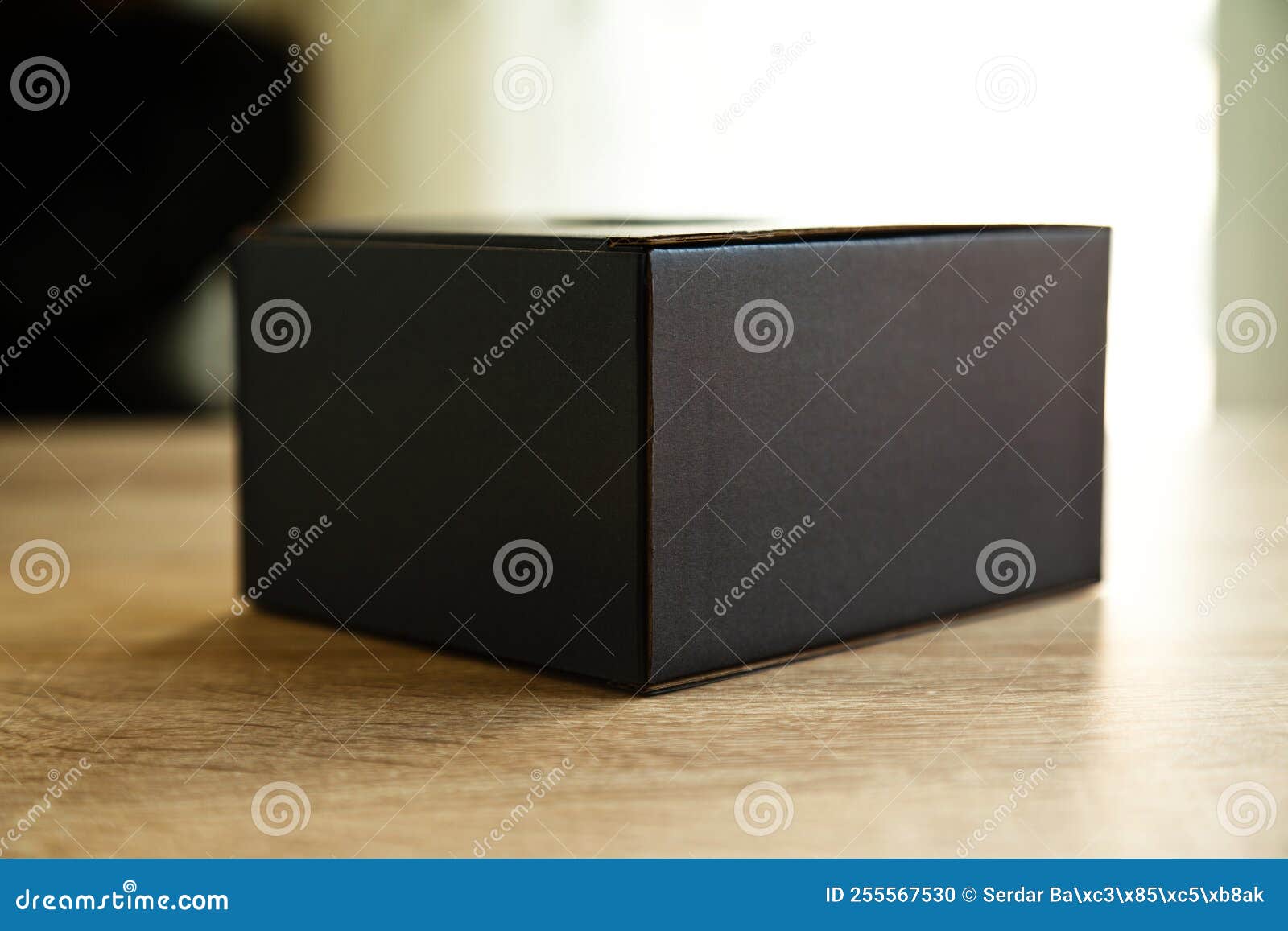 Closed Rectangular Cardboard Box with Corrugated Cardboard Lid, on Oak ...