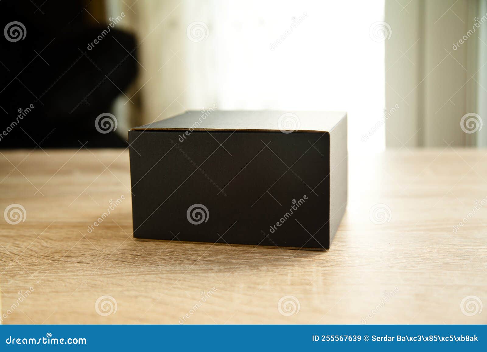Closed Rectangular Cardboard Box with Corrugated Cardboard Lid, on Oak ...