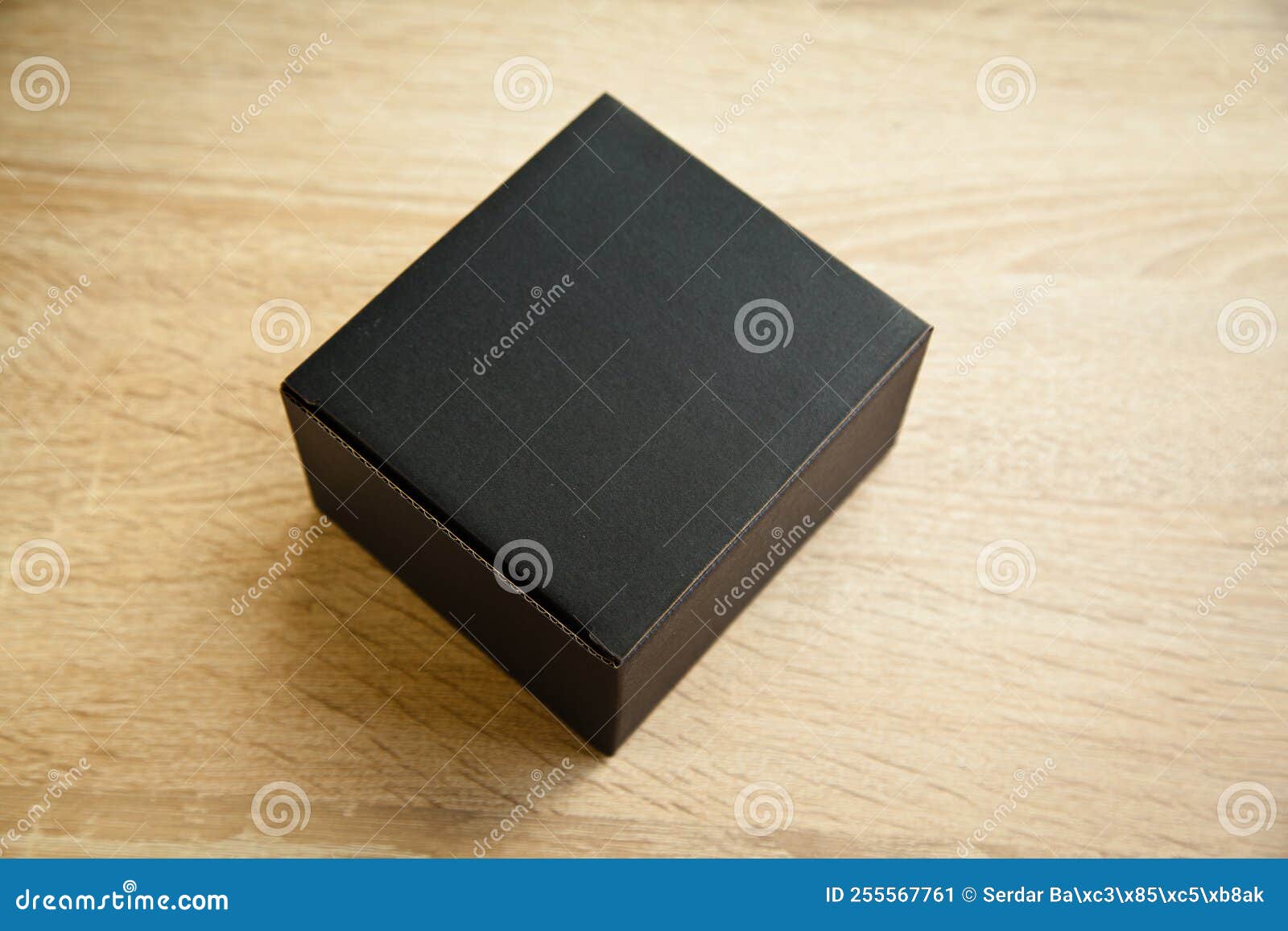 Closed Rectangular Cardboard Box with Corrugated Cardboard Lid, on Oak ...
