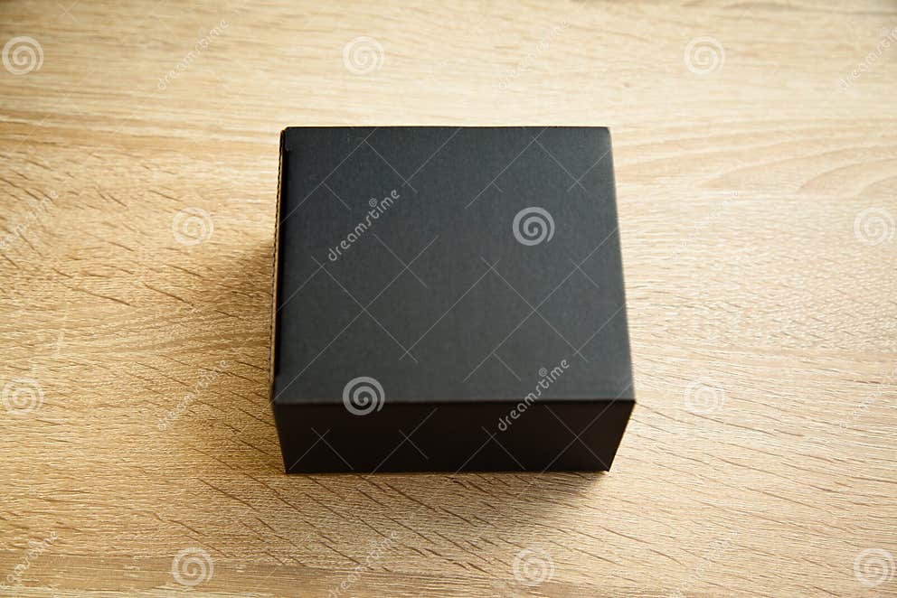 Closed Rectangular Cardboard Box with Corrugated Cardboard Lid, on Oak ...