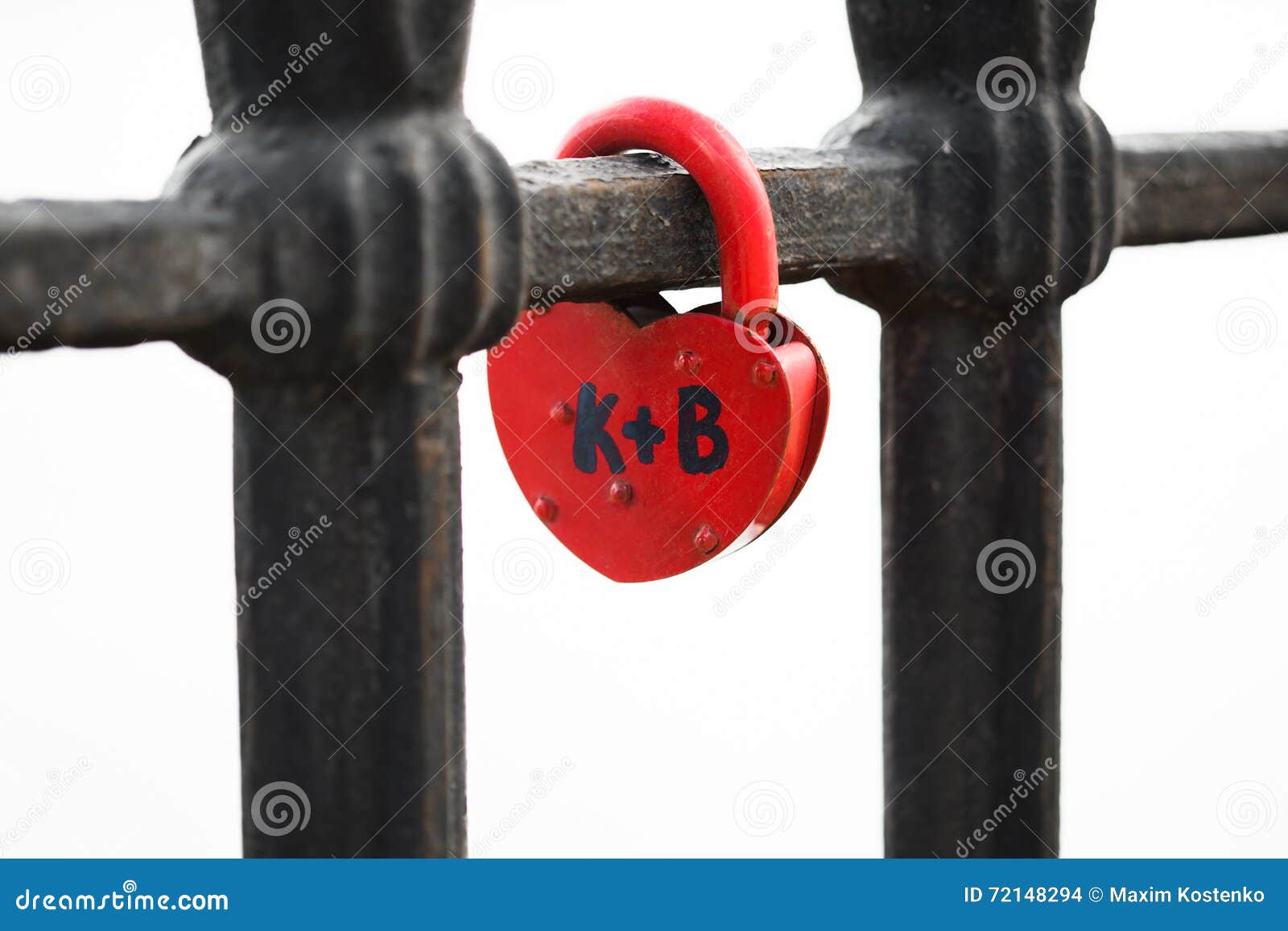 Closed Red Padlock in the Form of Heart Locked on Bridge. Stock Photo ...