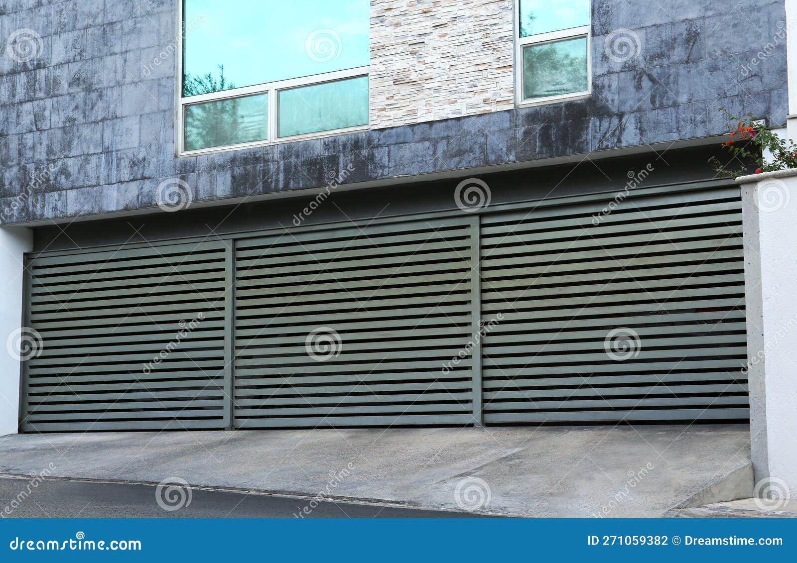 Closed Roller Shutter Gates of Modern Garage Stock Photo - Image of ...