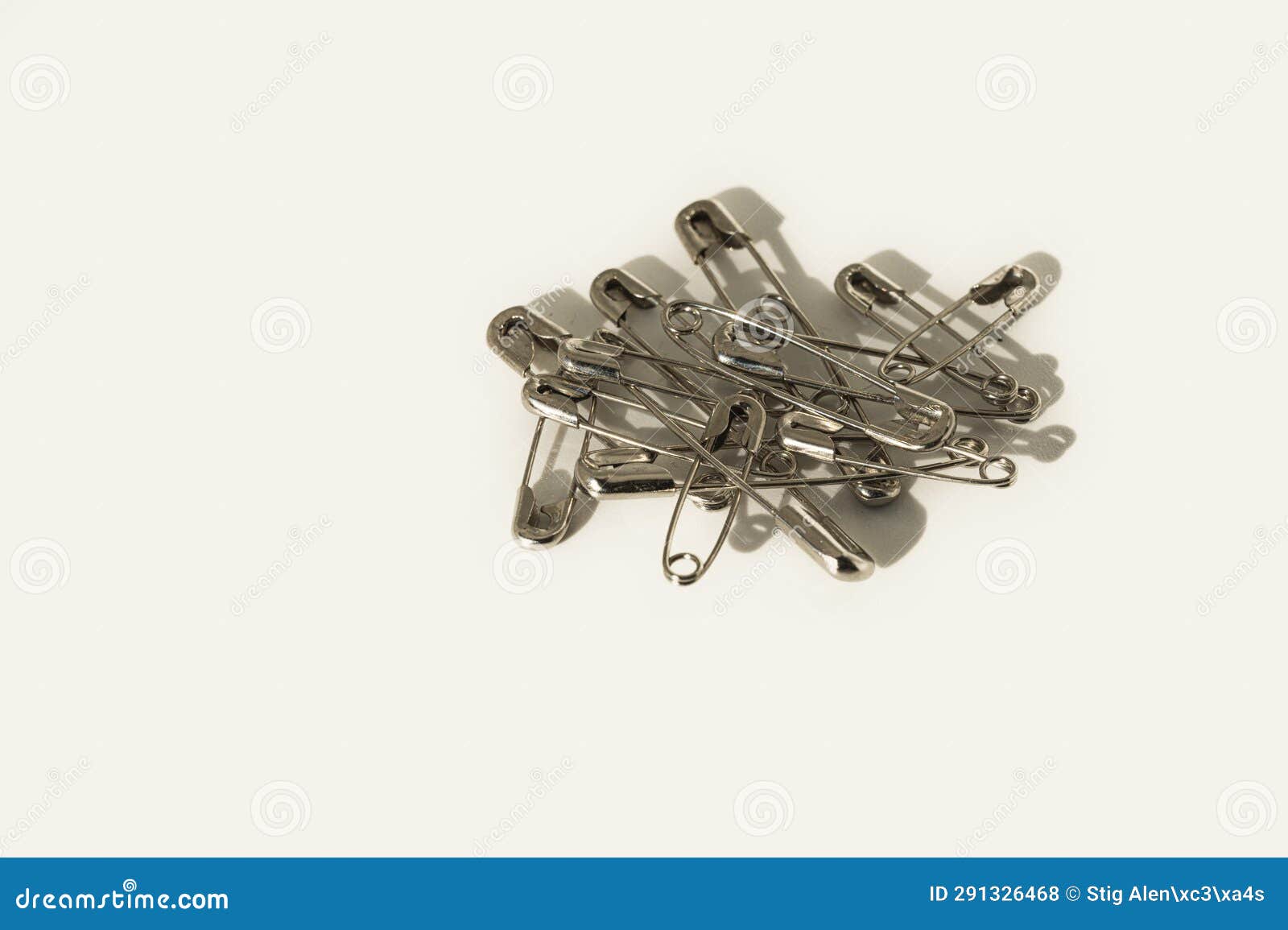 Closed Safety Pins on a White Background Stock Photo - Image of tool ...