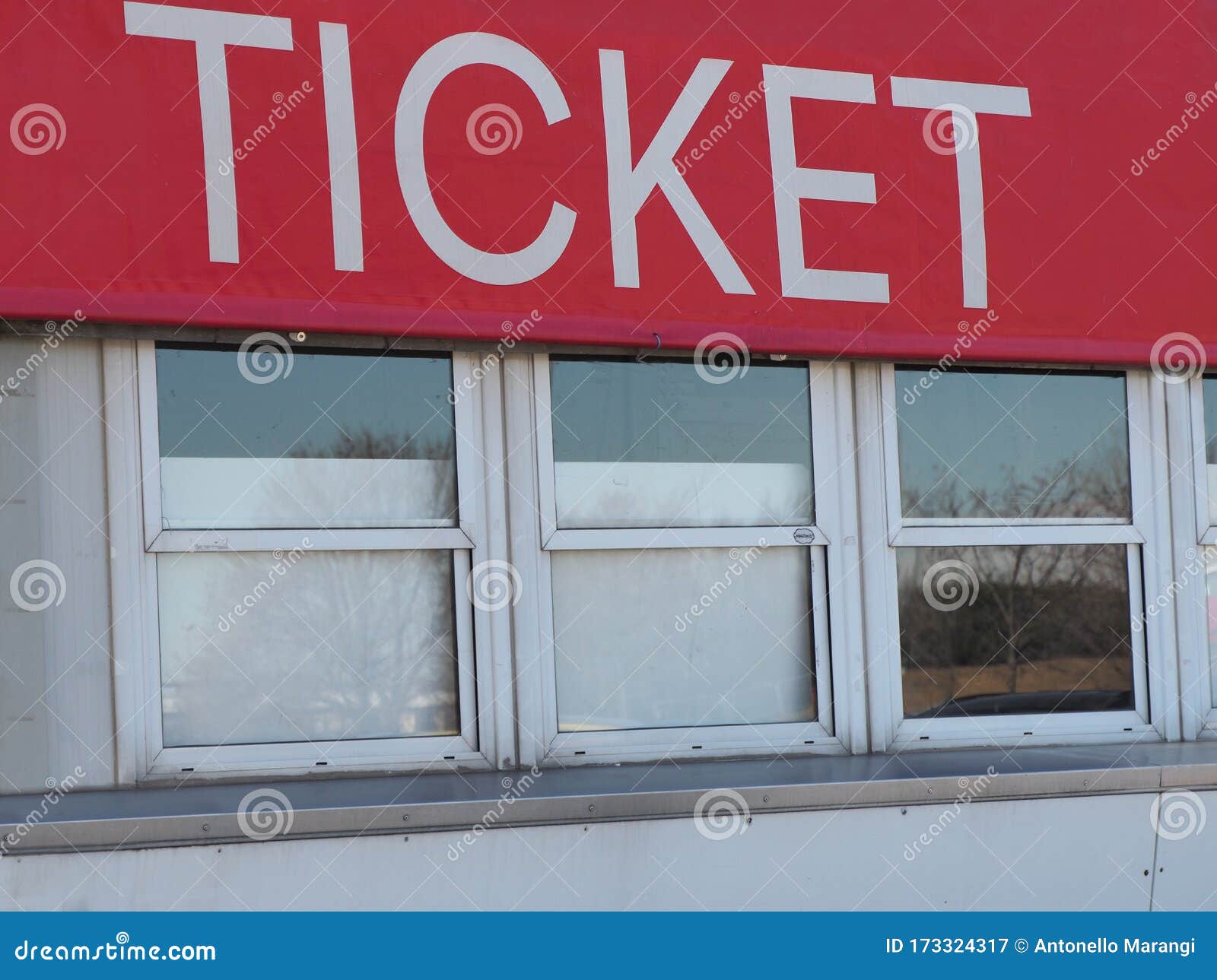 Closed Ticket Box Office Windows Under Big Red Sign Stock Image - Image ...