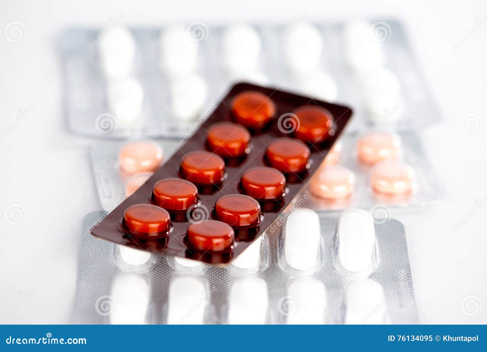 Red And Black Medicine Pill Capsule And Orange Circle Pill Over Pastel ...