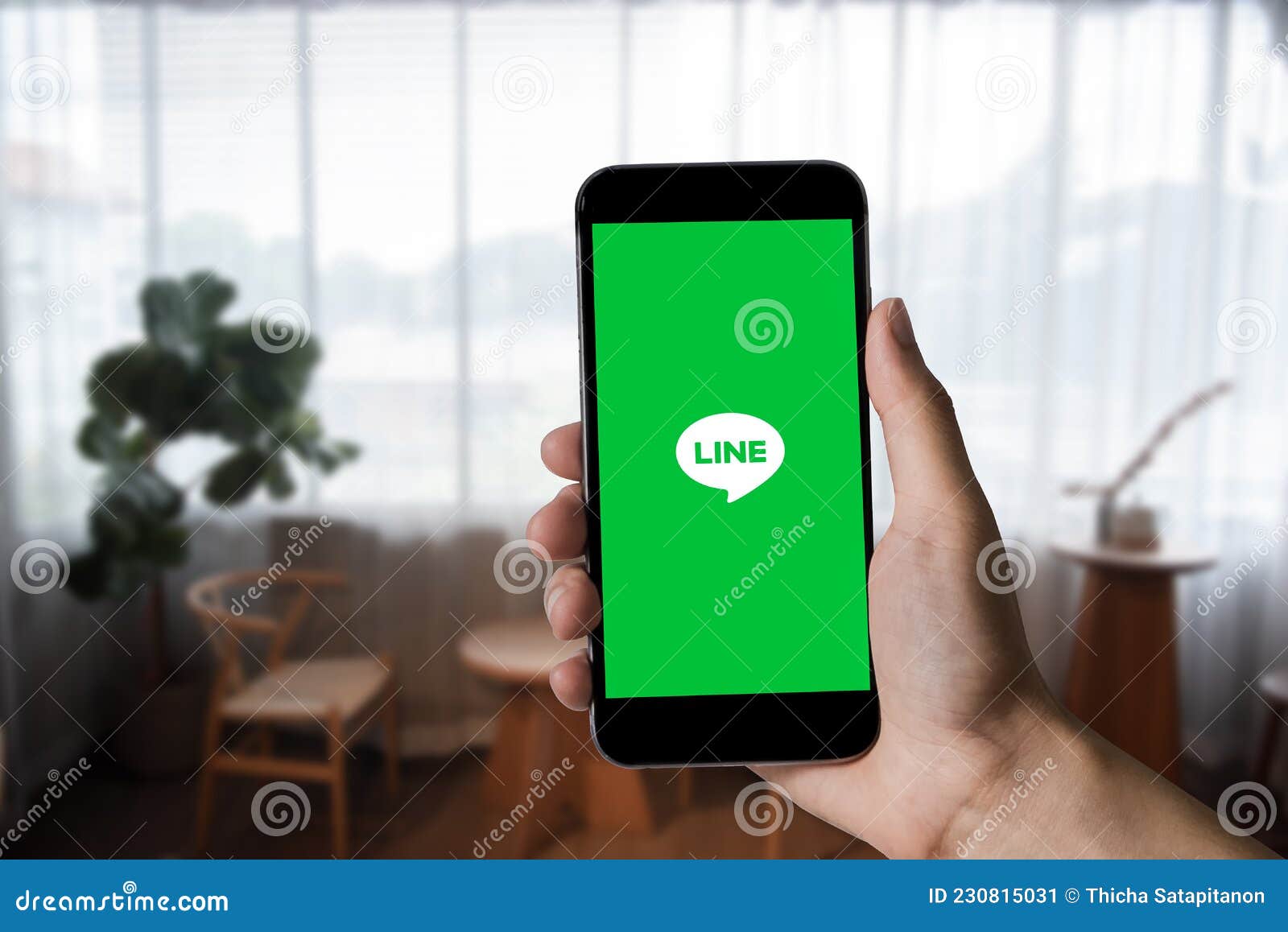 Closed Up Image of a Female Using Line Application on a Smartphone in ...