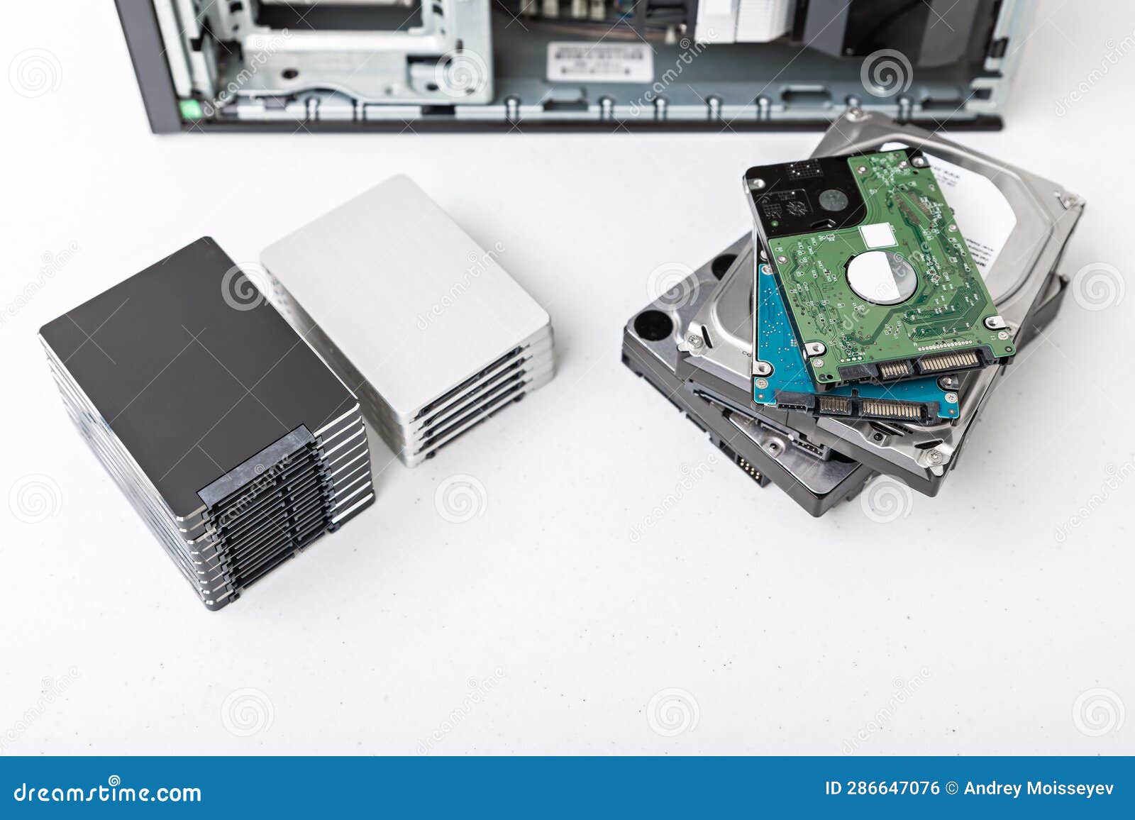 Closed-up View of Hard Disk Drives with PC in the Background Stock ...